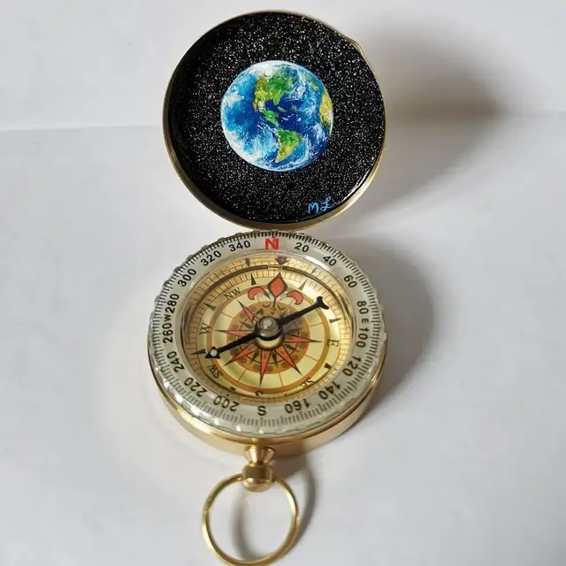 Earth's Compass, Me, Acrylic inside a pocket compass, 2022 | Scrolller