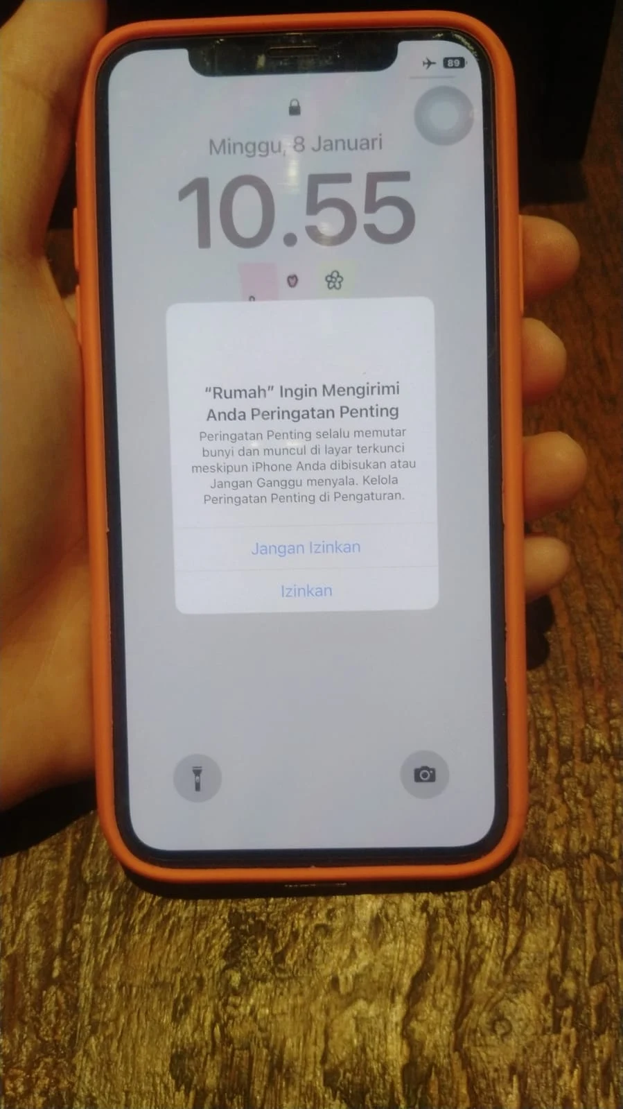 Help! My Friend Iphone stuck at this alert/notification, it says " "Home" want to send you a ...