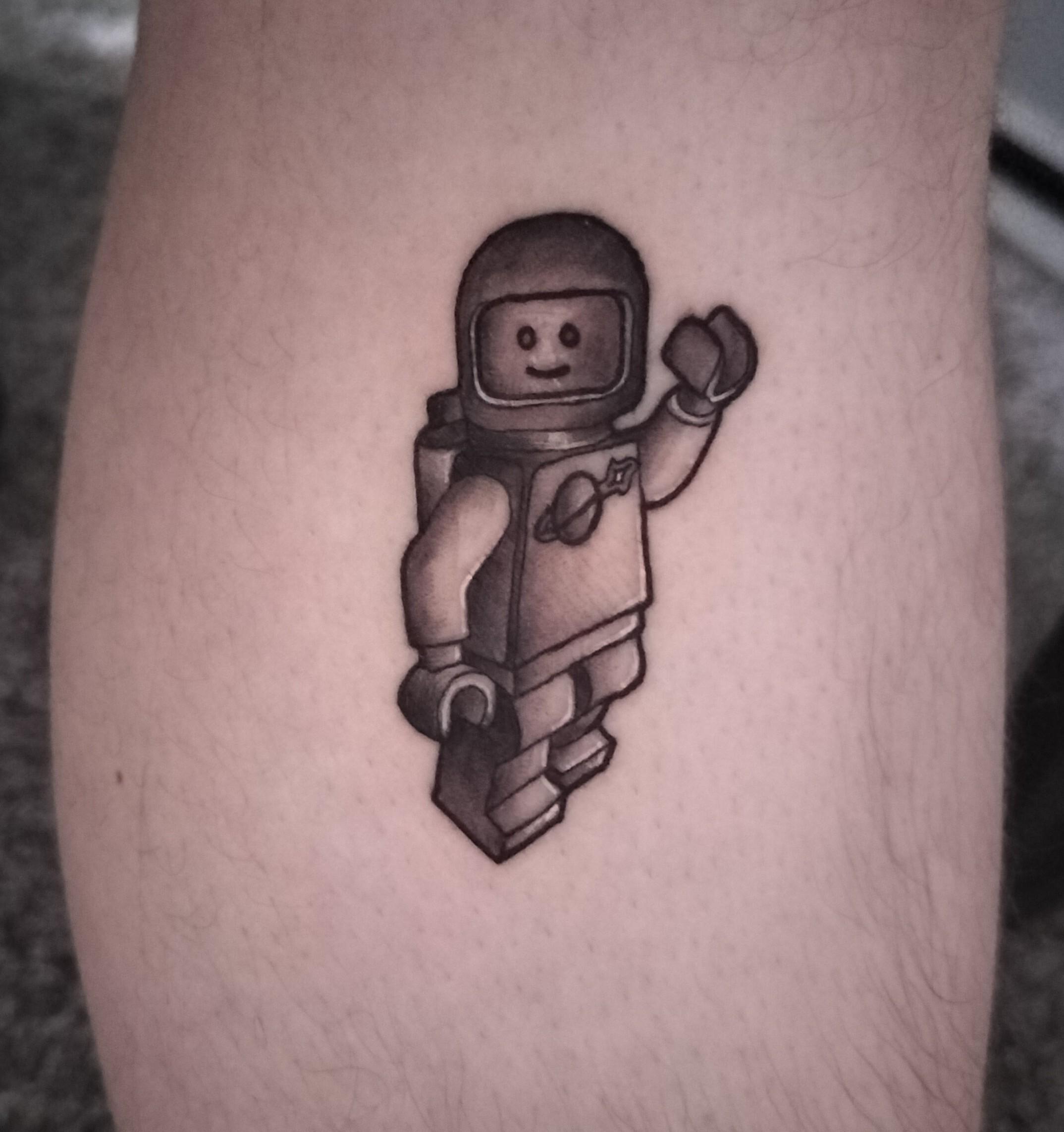 Lego space guy, by Alicia at CR ink in Columbia Missouri | Scrolller