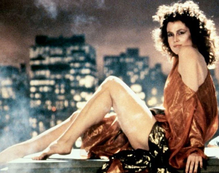 Sigourney Weaver as Dana Barrett, flashing some leg in Ghostbusters 1984. | Scrolller