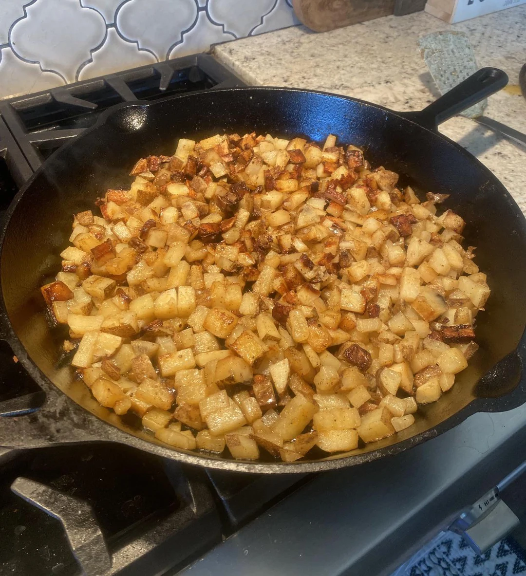 Frying potatoes | Scrolller