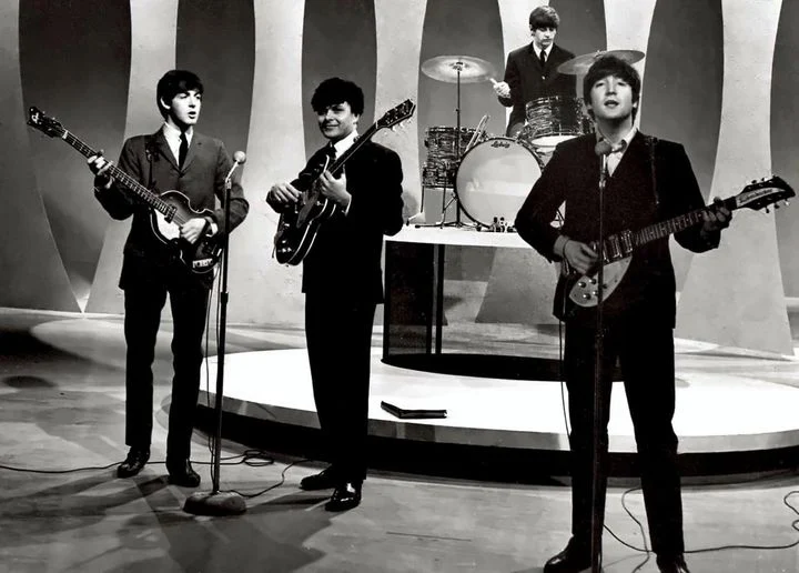 The Beatles on the Ed Sullivan Show in 1964. L-R: Paul, Vince, Ringo & John | Scrolller