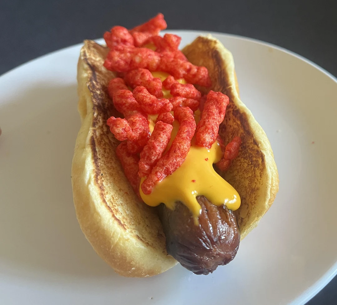 Hot Cheetos + nacho cheese + charcoal grilled hot dog + brioche bun | Scrolller