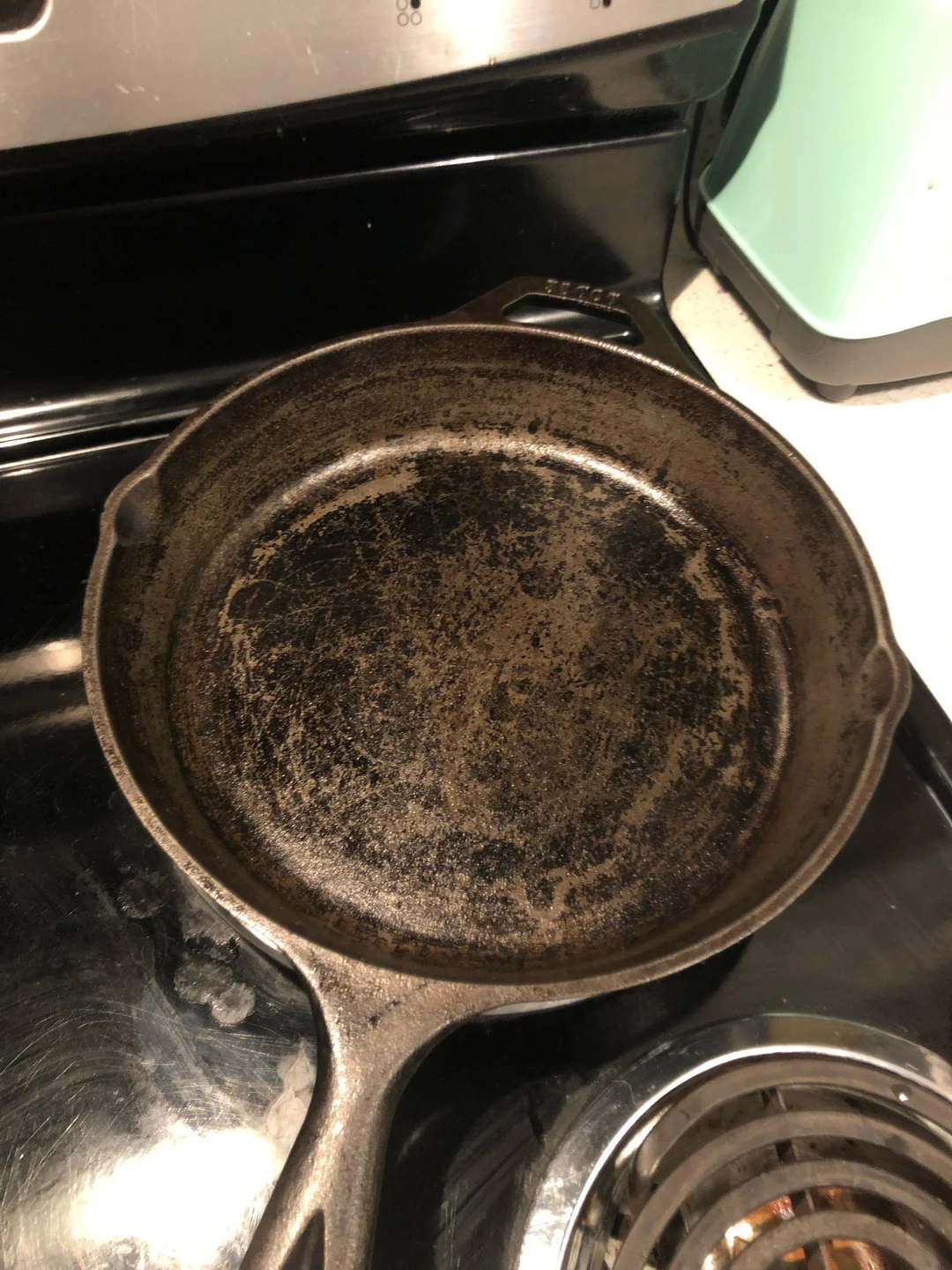 Why does my pan have the black spots? Is it from burnt on food? | Scrolller