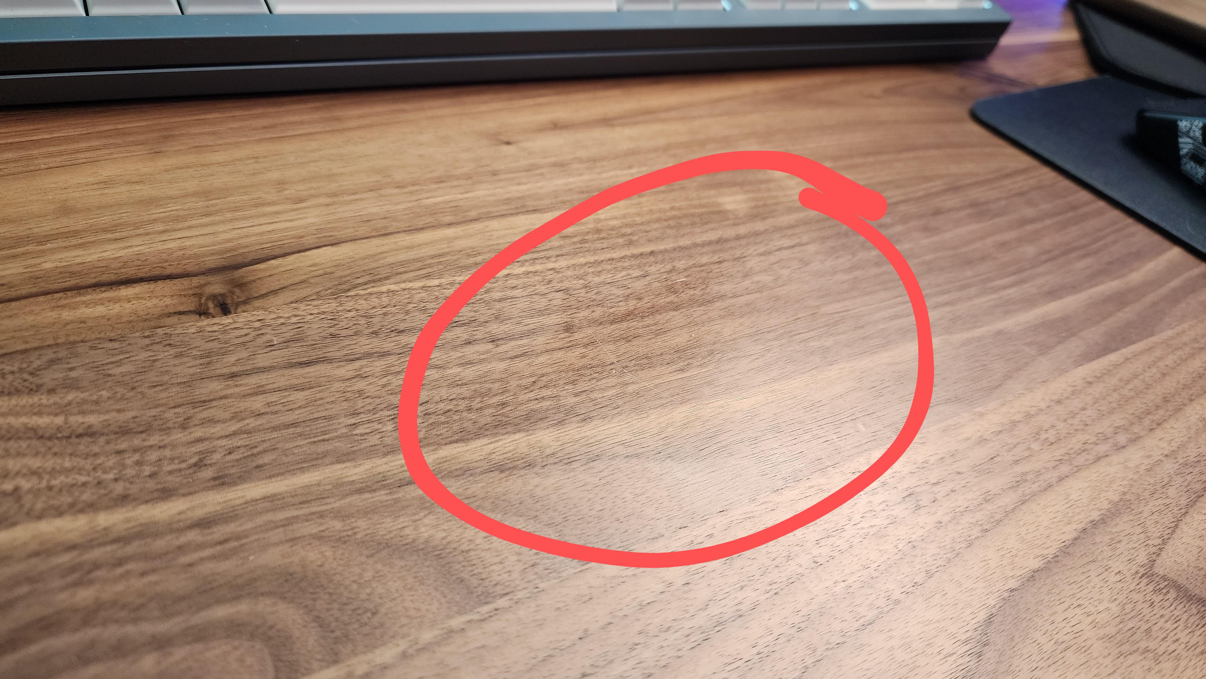 How can I fix these shiny spots and tiny scratches on my desk? | Scrolller