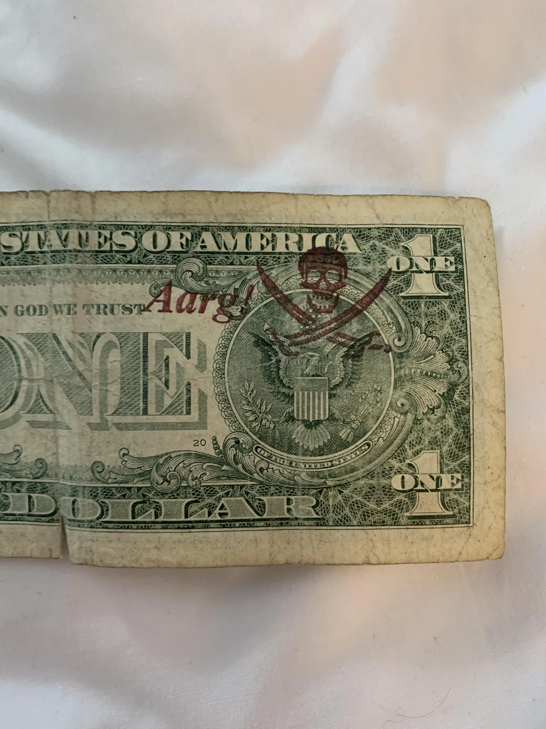 Stamp on a Dollar Bill | Scrolller