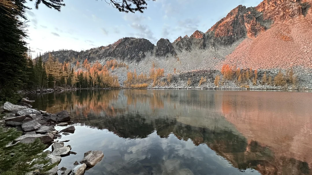 Larch Rimmed Lake | Scrolller