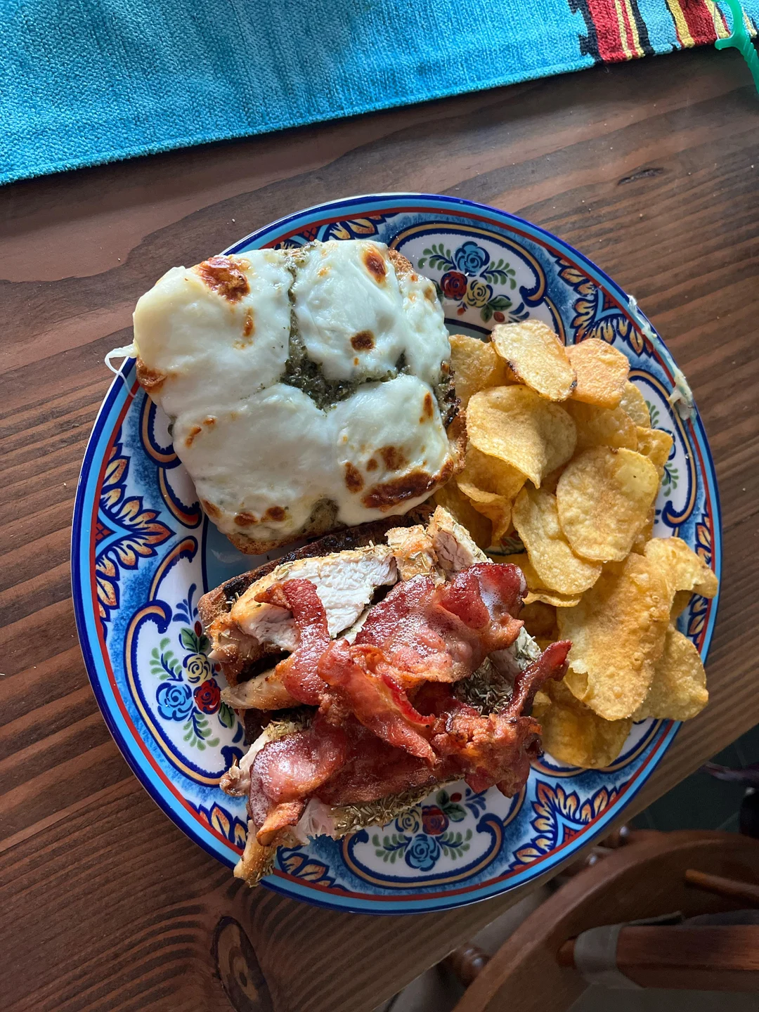 [OC] Seasoned chicken on toasted ciabatta with fresh mozzarella and pesto, topped with bacon ...