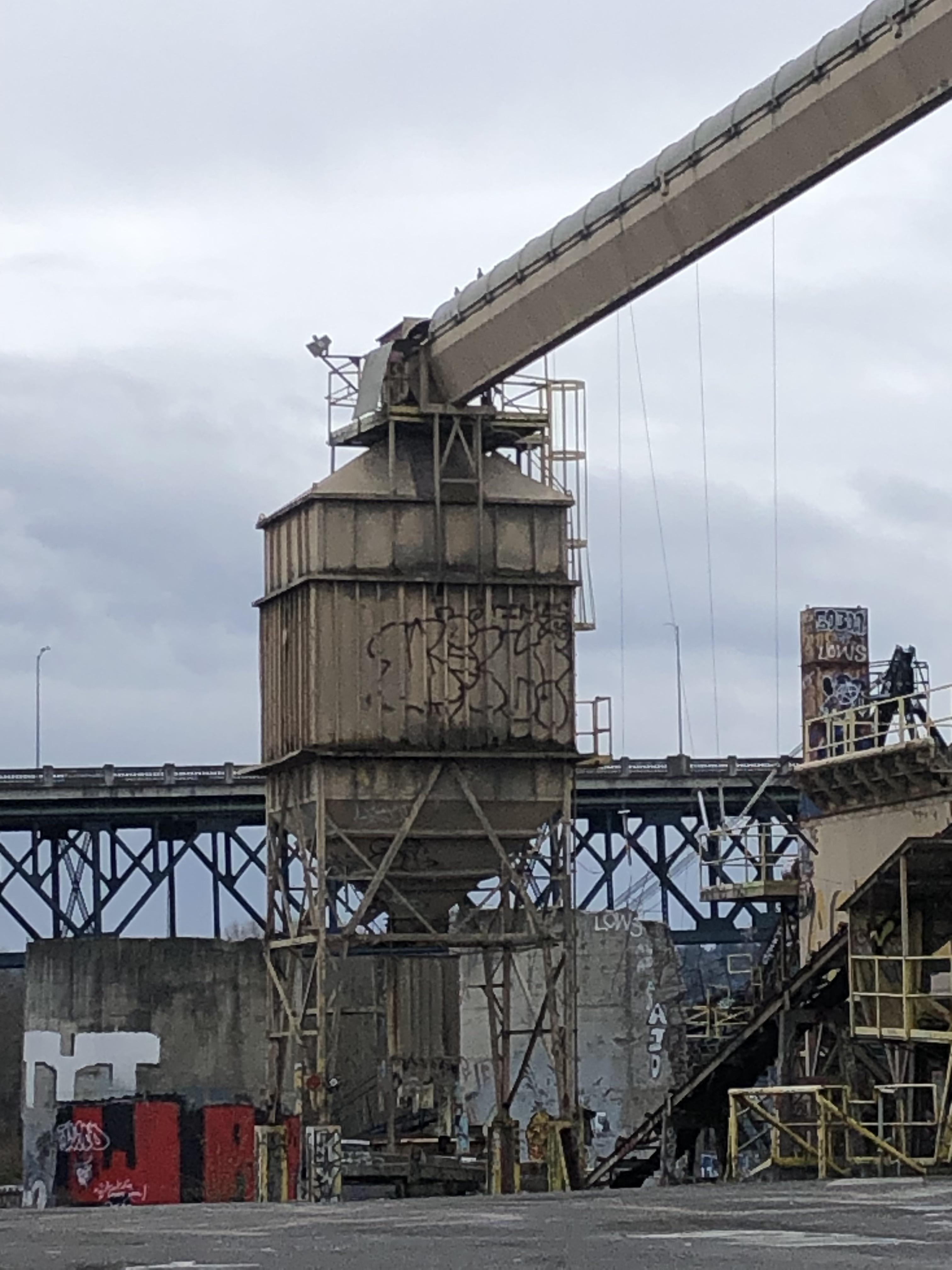 Another section of an abandoned concrete factory. Anyone know what this structure might have ...