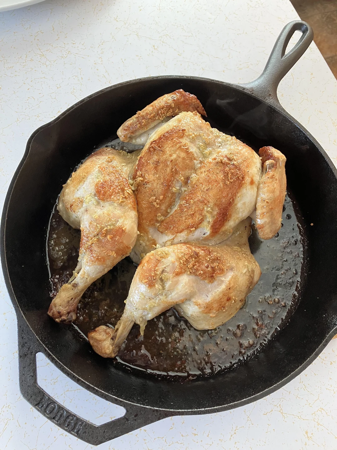 Spatchcocked garlic & rosemary roasted chicken | Scrolller