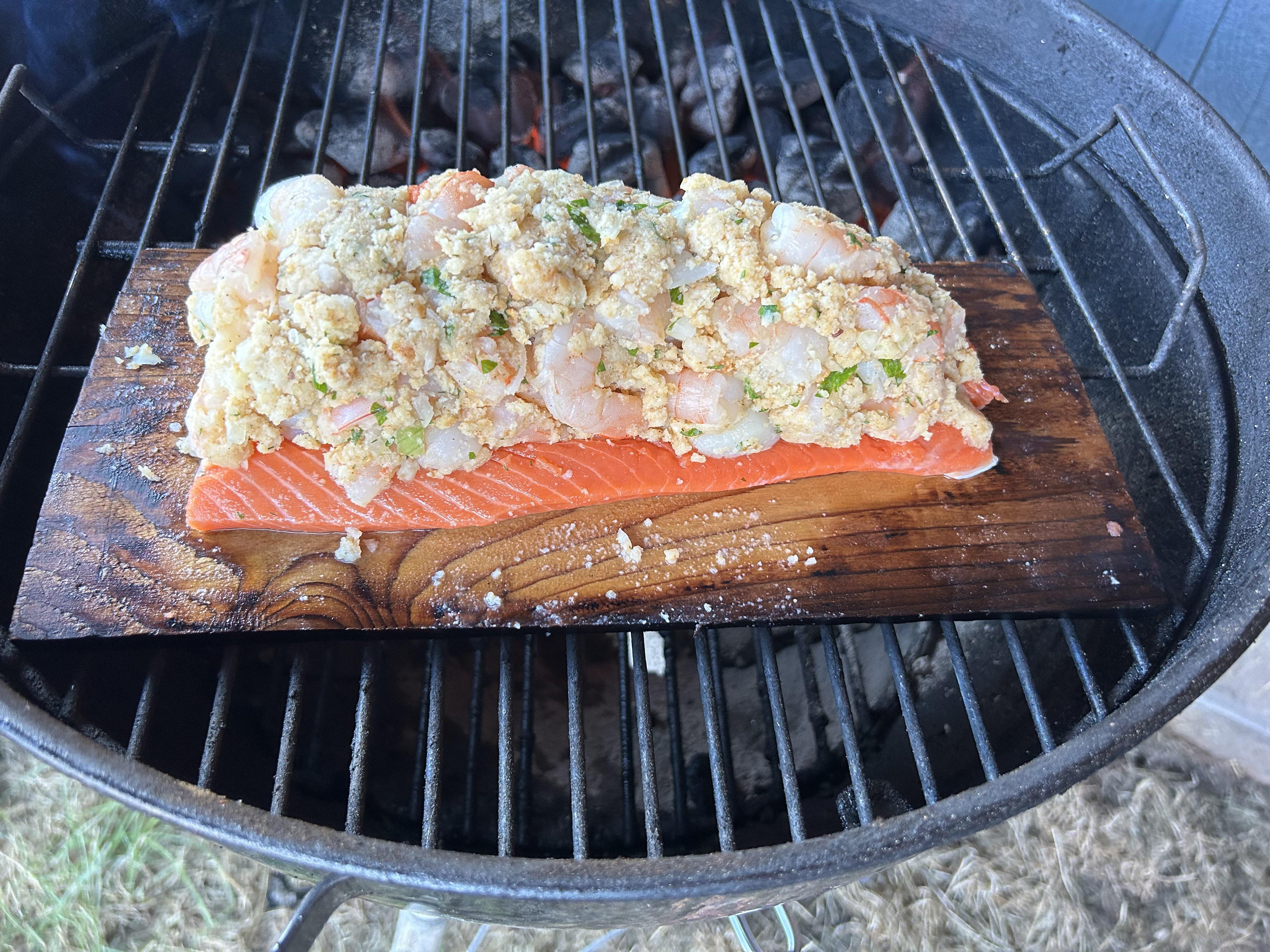 Baked stuffed native Alaskan salmon on cedar plank | Scrolller