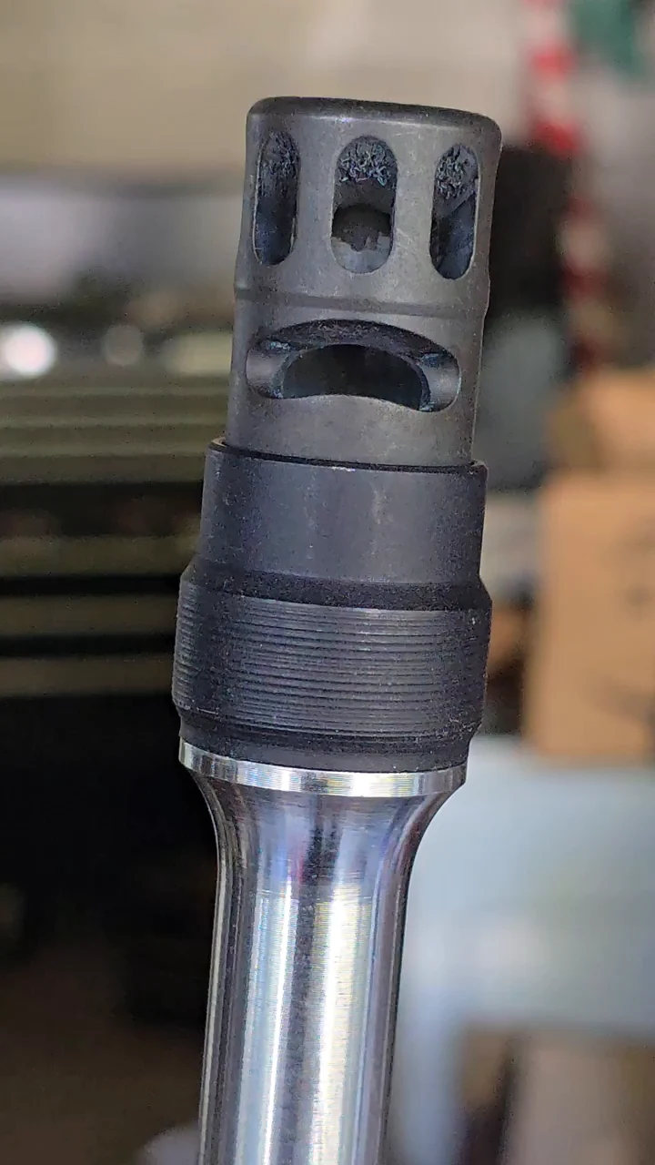 Your ARs may be cool, but they're still not cool enough to have a QD muzzle device like mine ...