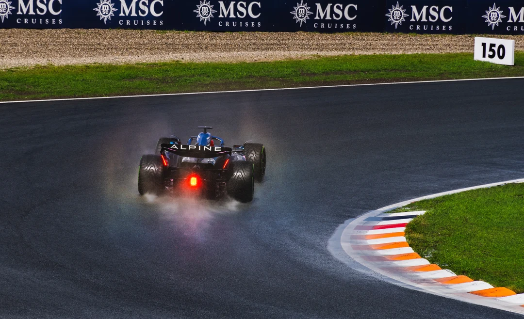 2023 Heineken Dutch GP (Esteban Ocon) Rainbow appearing at T9 on a wet track during qualifying ...