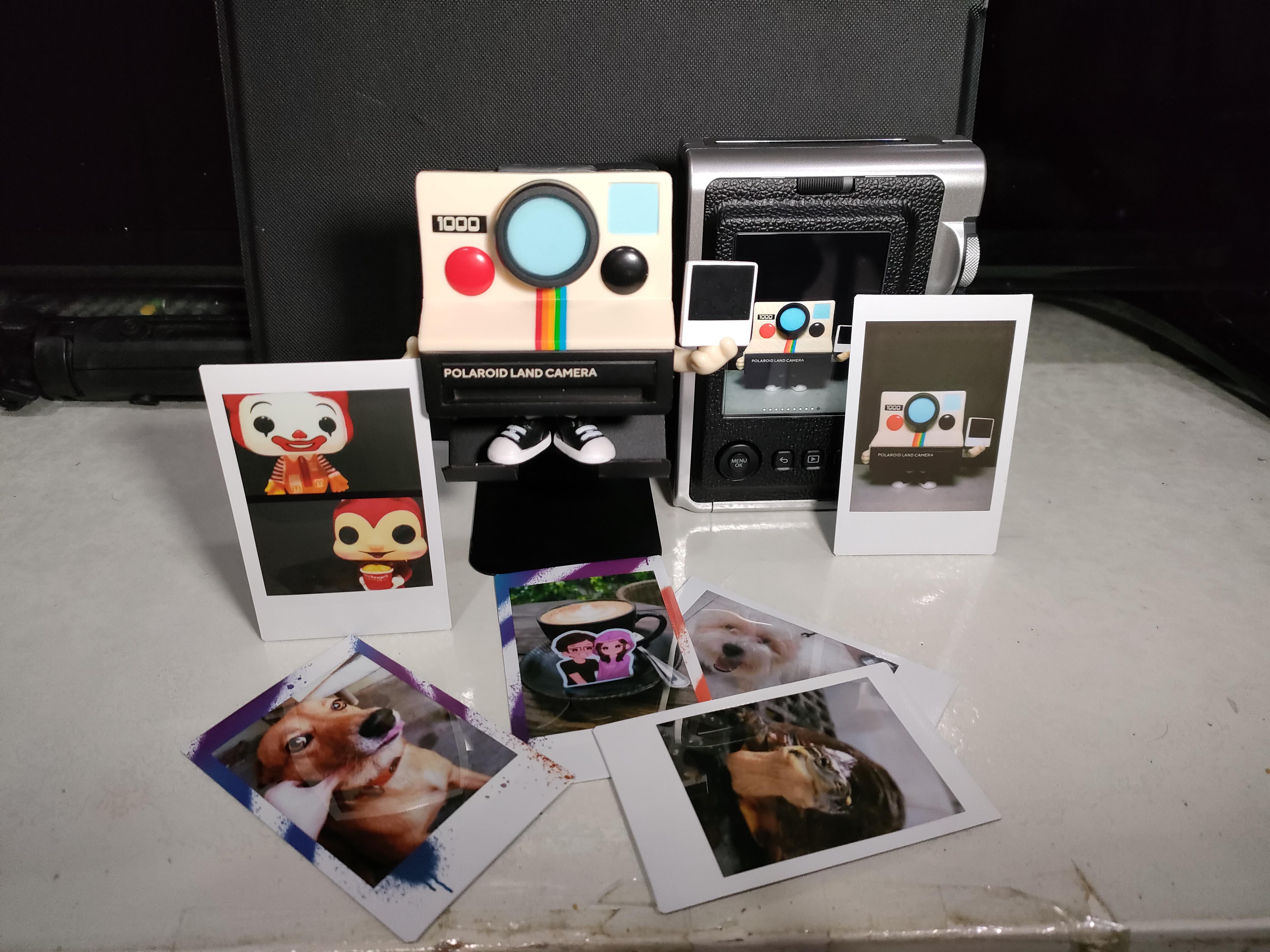 Polaroid Funko Pop, shot with a smartphone and the Instax Evo Mini | Scrolller