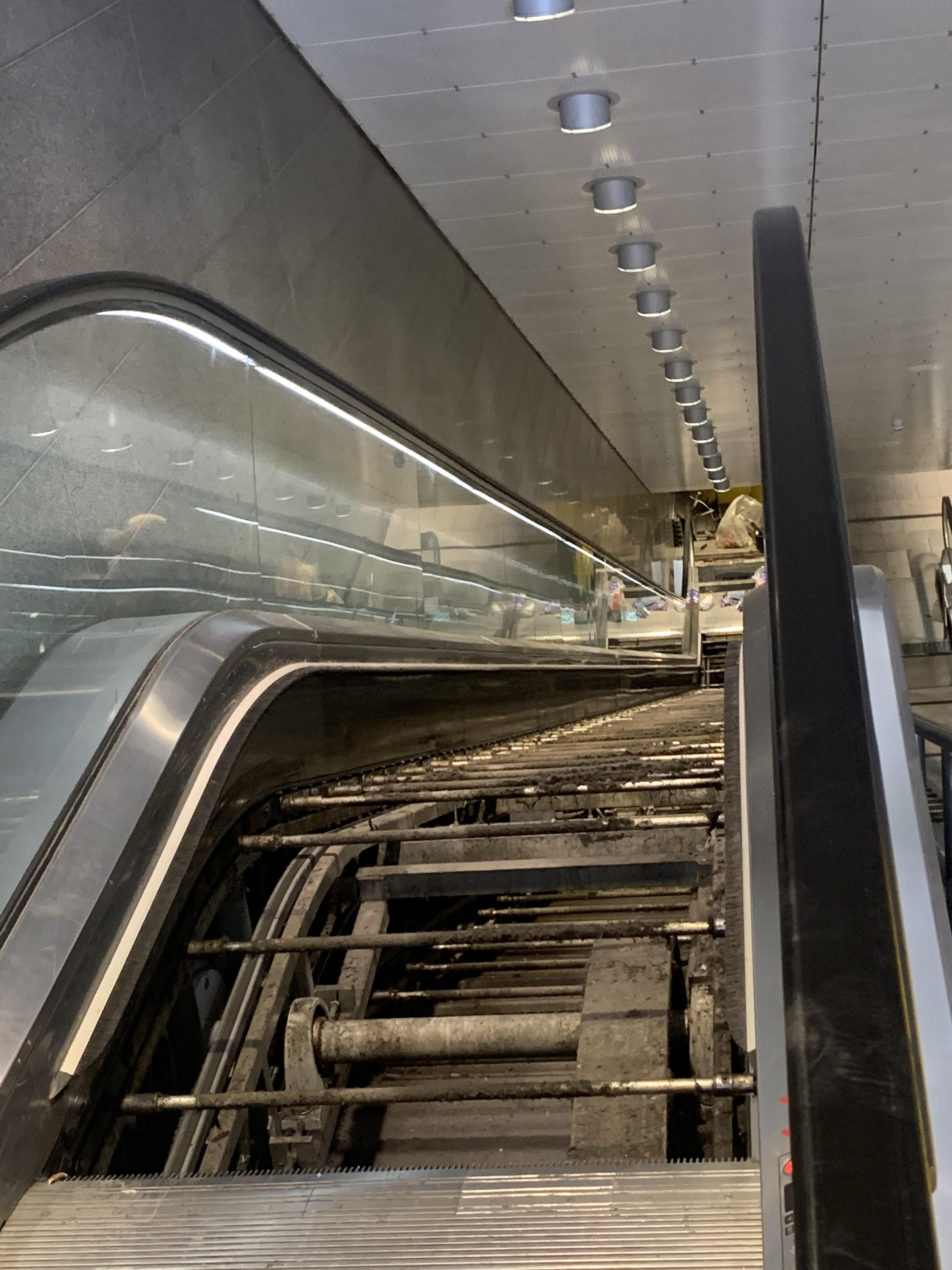 A peeled escalator | Scrolller