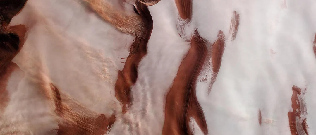 Part of the ice cap sitting at Mars' north pole. | Scrolller