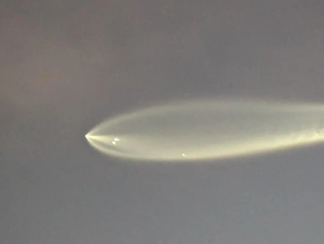 What are these little spots behind the SpaceX rocket out of VFB tonight? | Scrolller