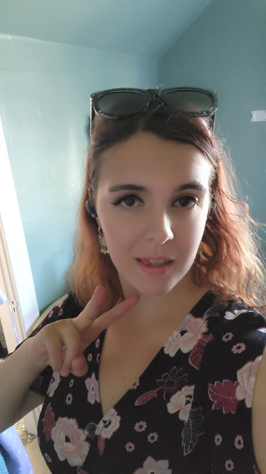 Dyed hair red, dark brown roots are going in wanting to keep growing my hair put but undecided ...