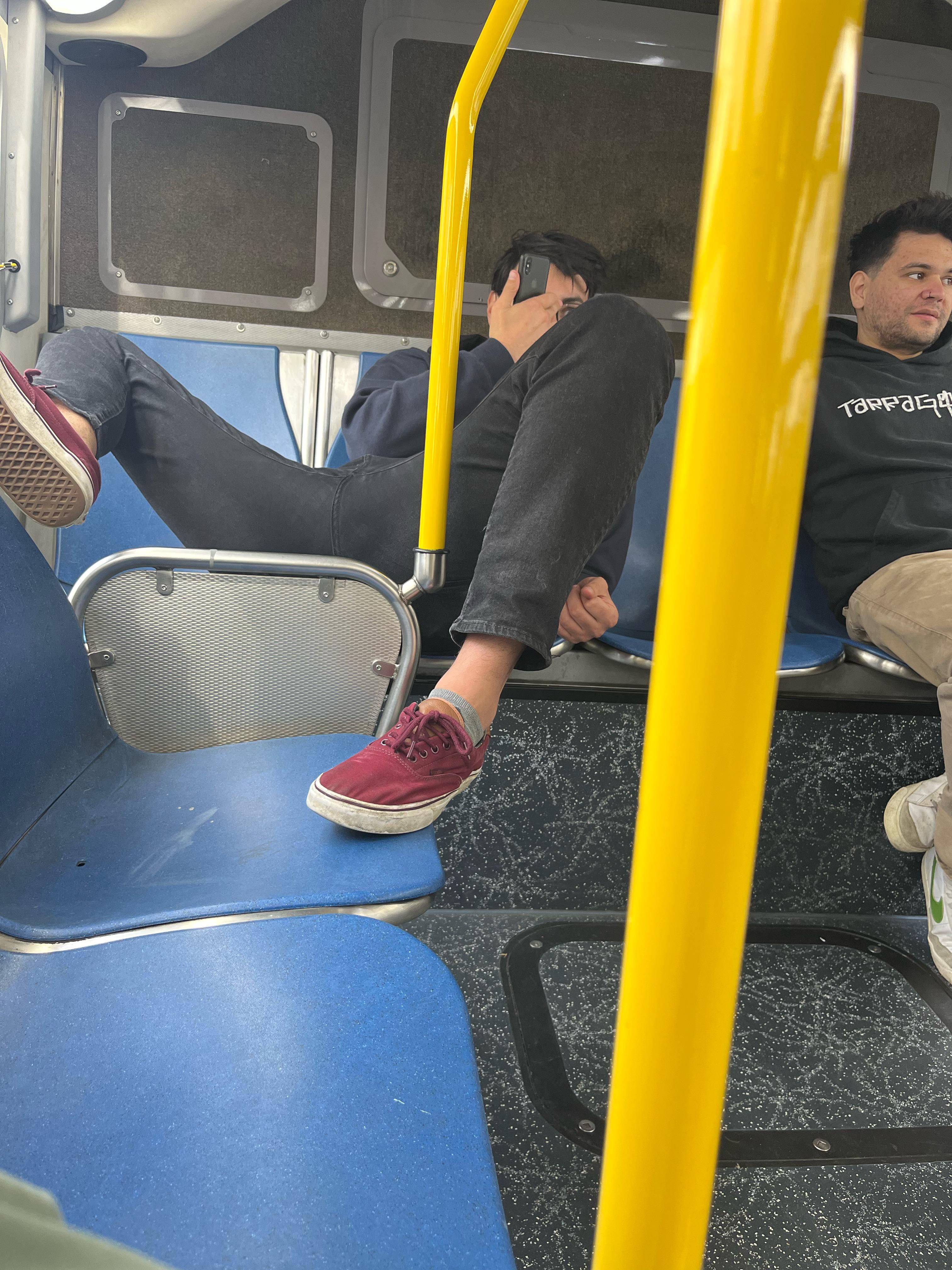 People who put their feet up on seats in public transport | Scrolller