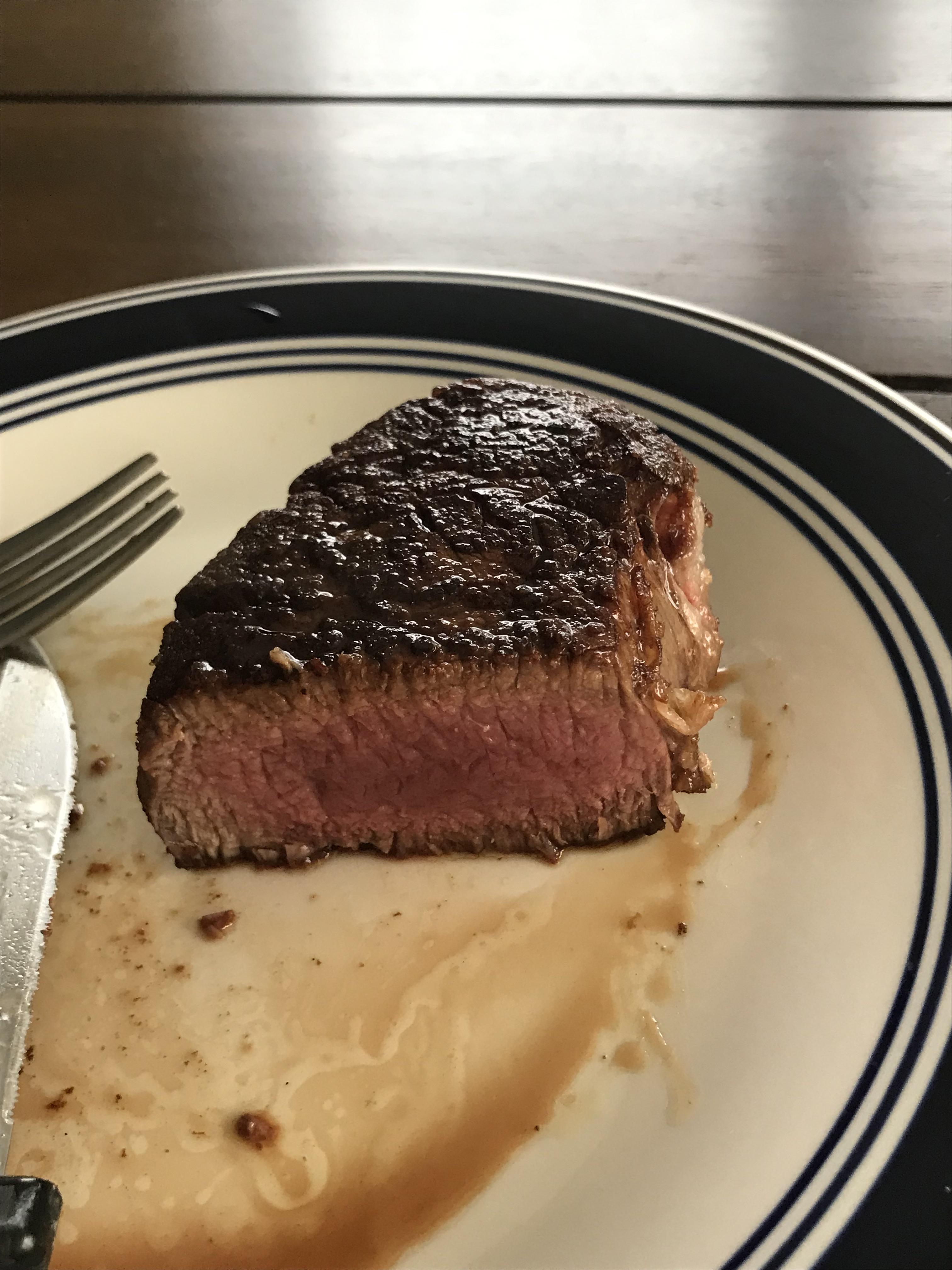 A beautiful medium rare on a pan fried filet mignon | Scrolller