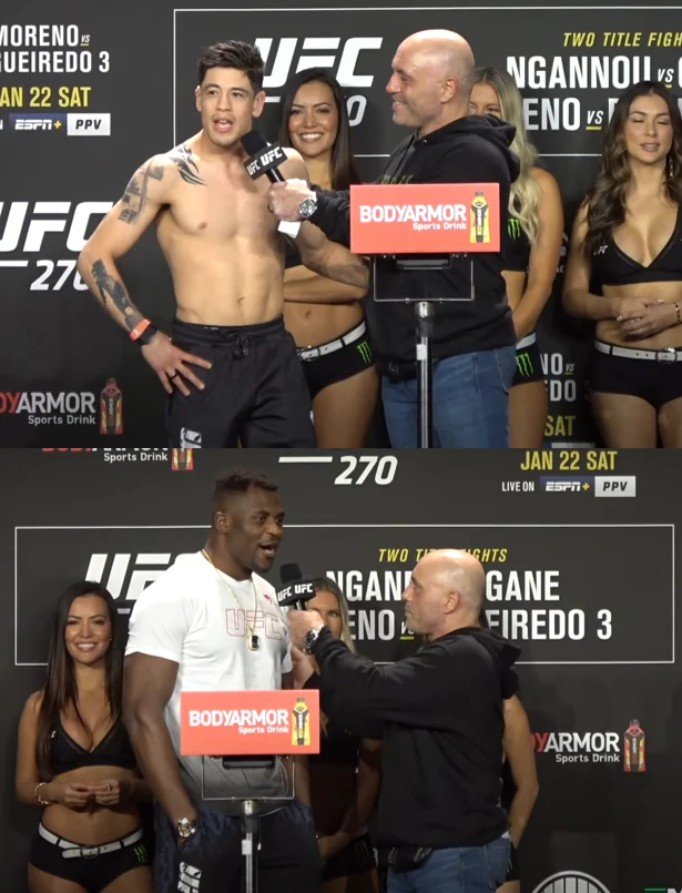 Joe Rogan standing next to both of tomorrow night's champions | Scrolller