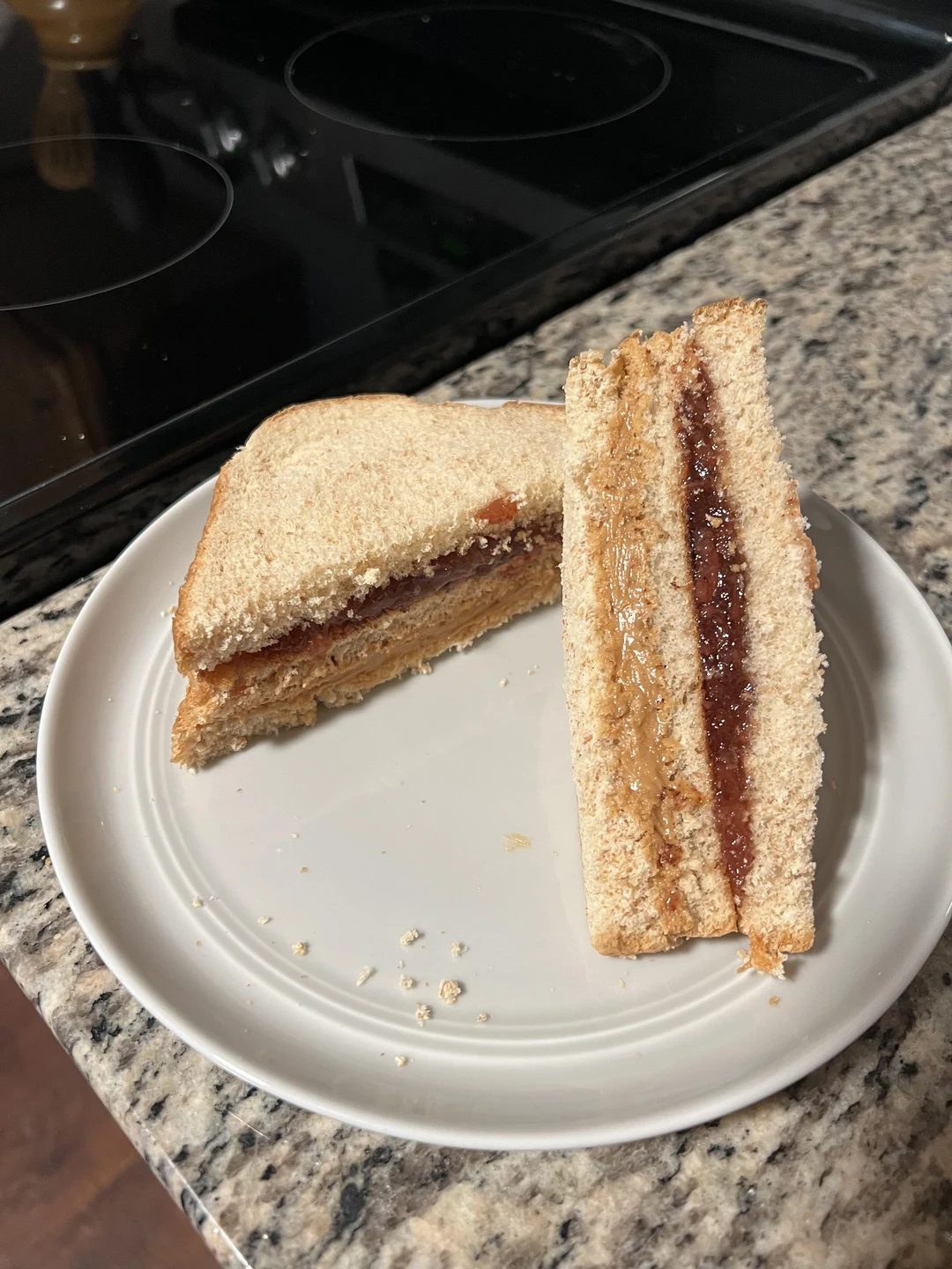 Triple decker PB&J. Middle slice is toasted. | Scrolller