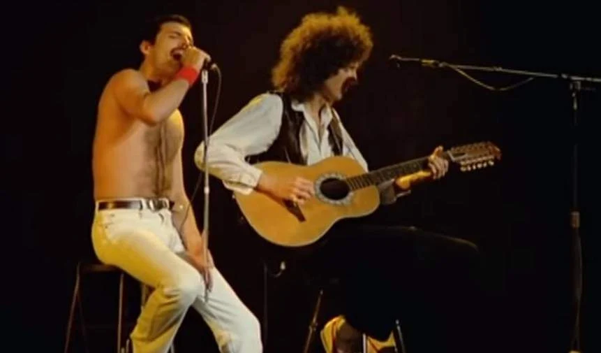 To commemorate Sir Brian May's 76th birthday, here he is with Freddie Mercury, performing "Love ...