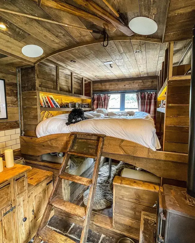 Cozy elevator bed in truck converted into a mobile cabin | Scrolller