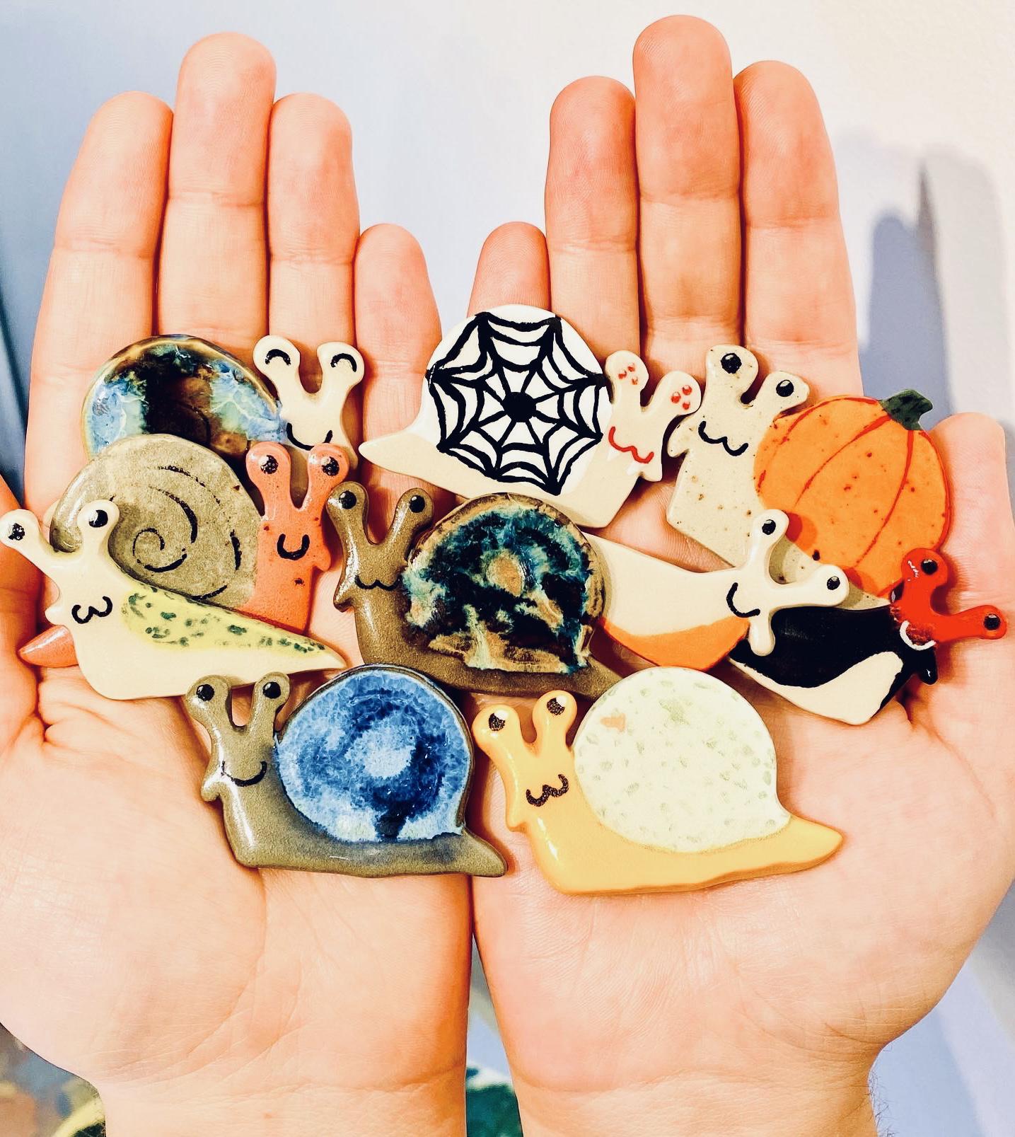 (OC) A bunch of colourful ceramic snails and slugs I made! Hope they can brighten your day!!😊🐌 ...