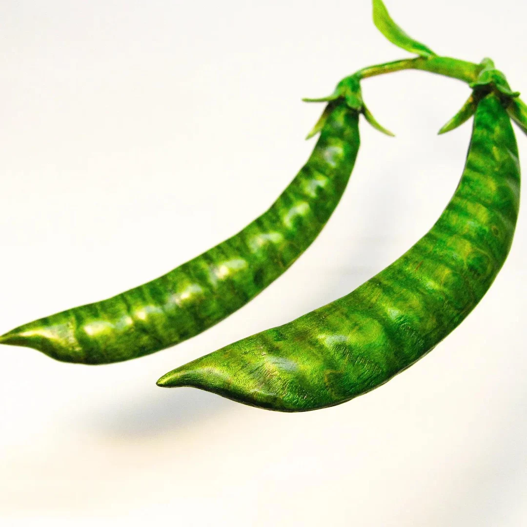 Pea pods, me, carved wood, 2023 | Scrolller