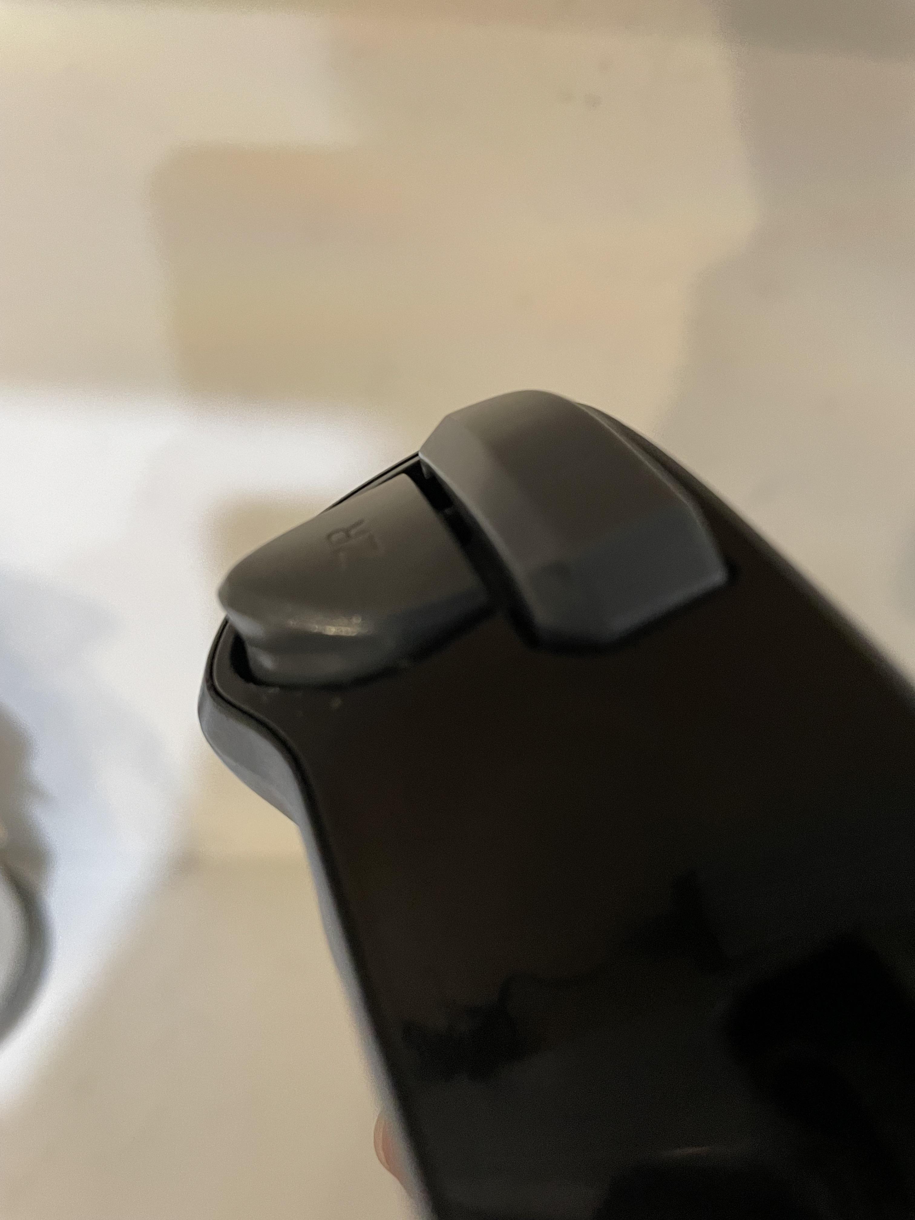 Anyone know how to fix this stuck ZR button? | Scrolller