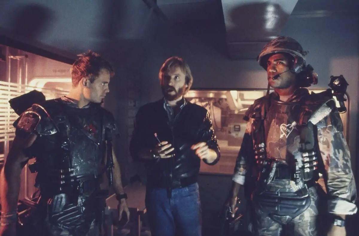 Michael Biehn (Hicks), James Cameron & Ricco Ross (Frost) on the set of Aliens 1986 | Scrolller