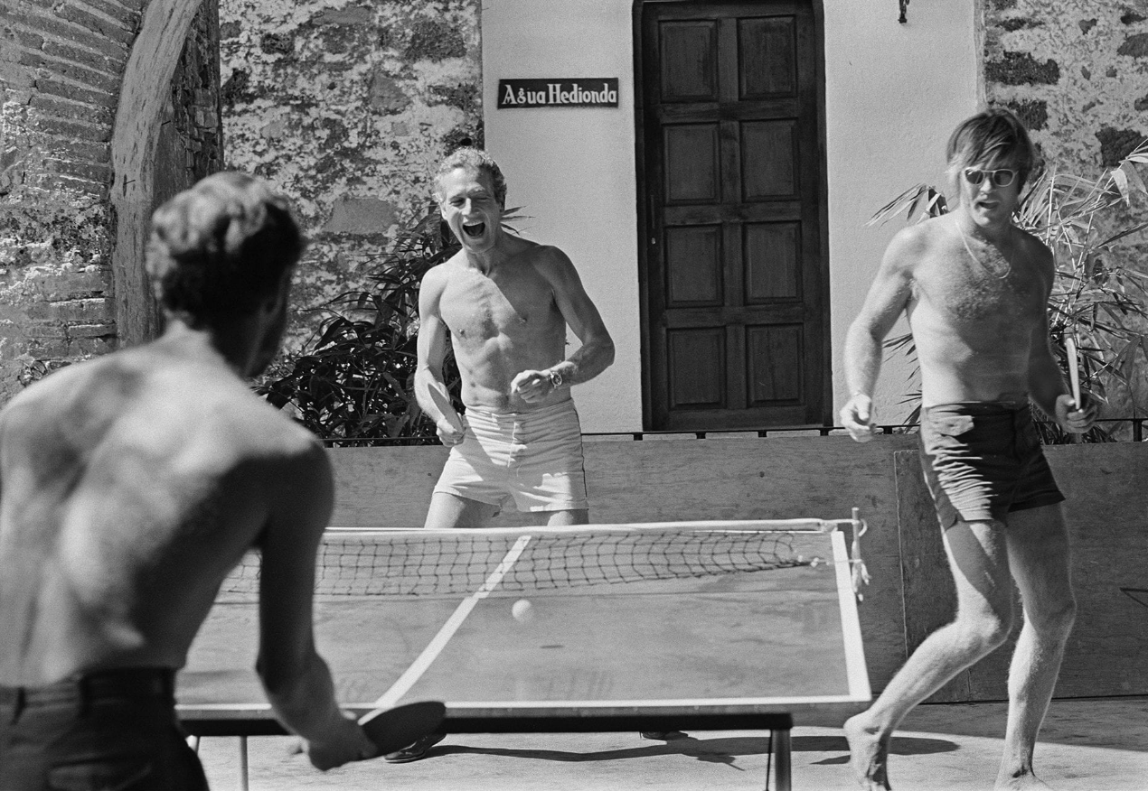 Paul Newman and Robert Redford playing ping pong on a break from shooting Butch Cassidy and The ...