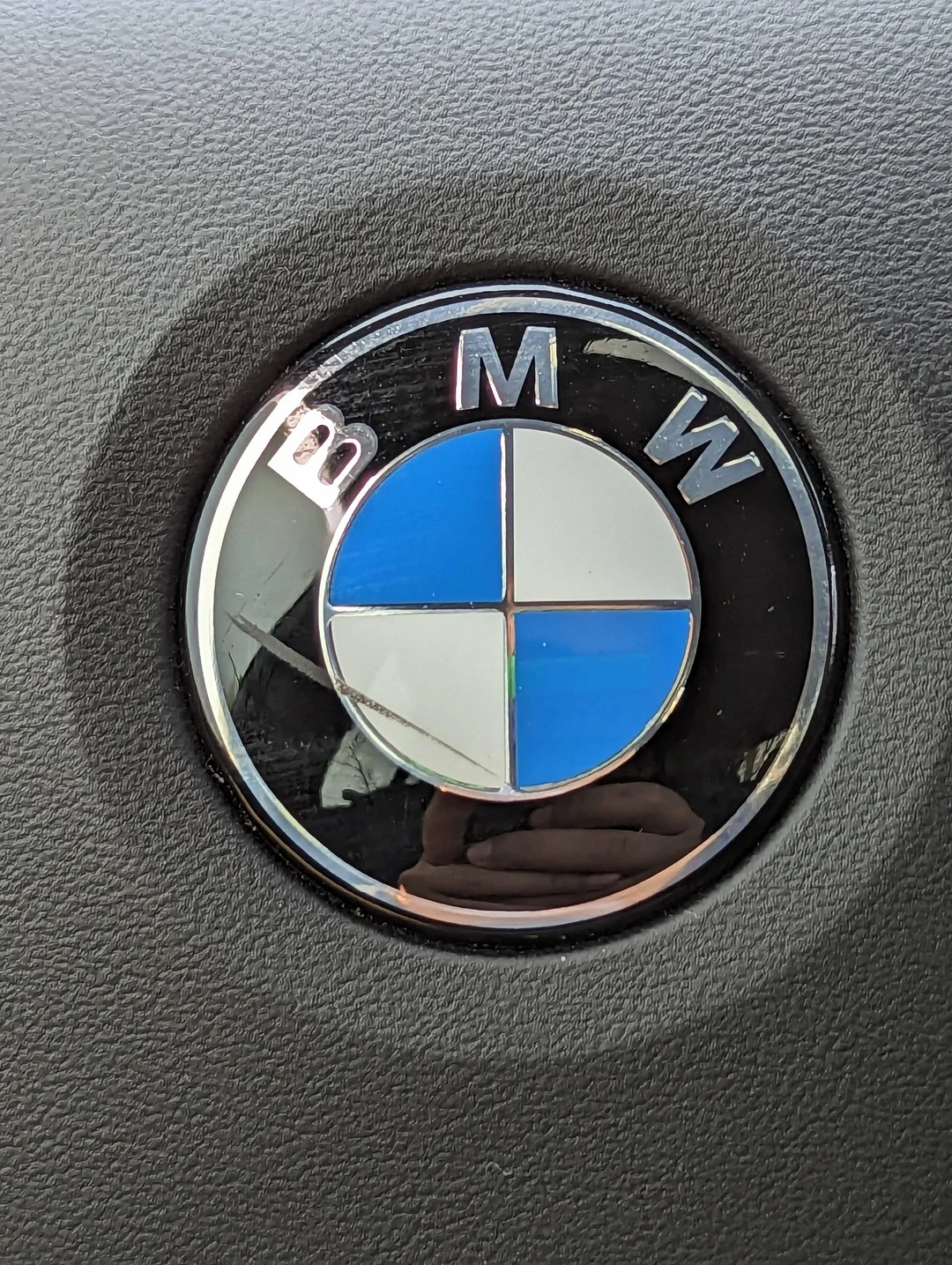 Hey y'all how do I get this scratch off of my steering wheel emblem? | Scrolller