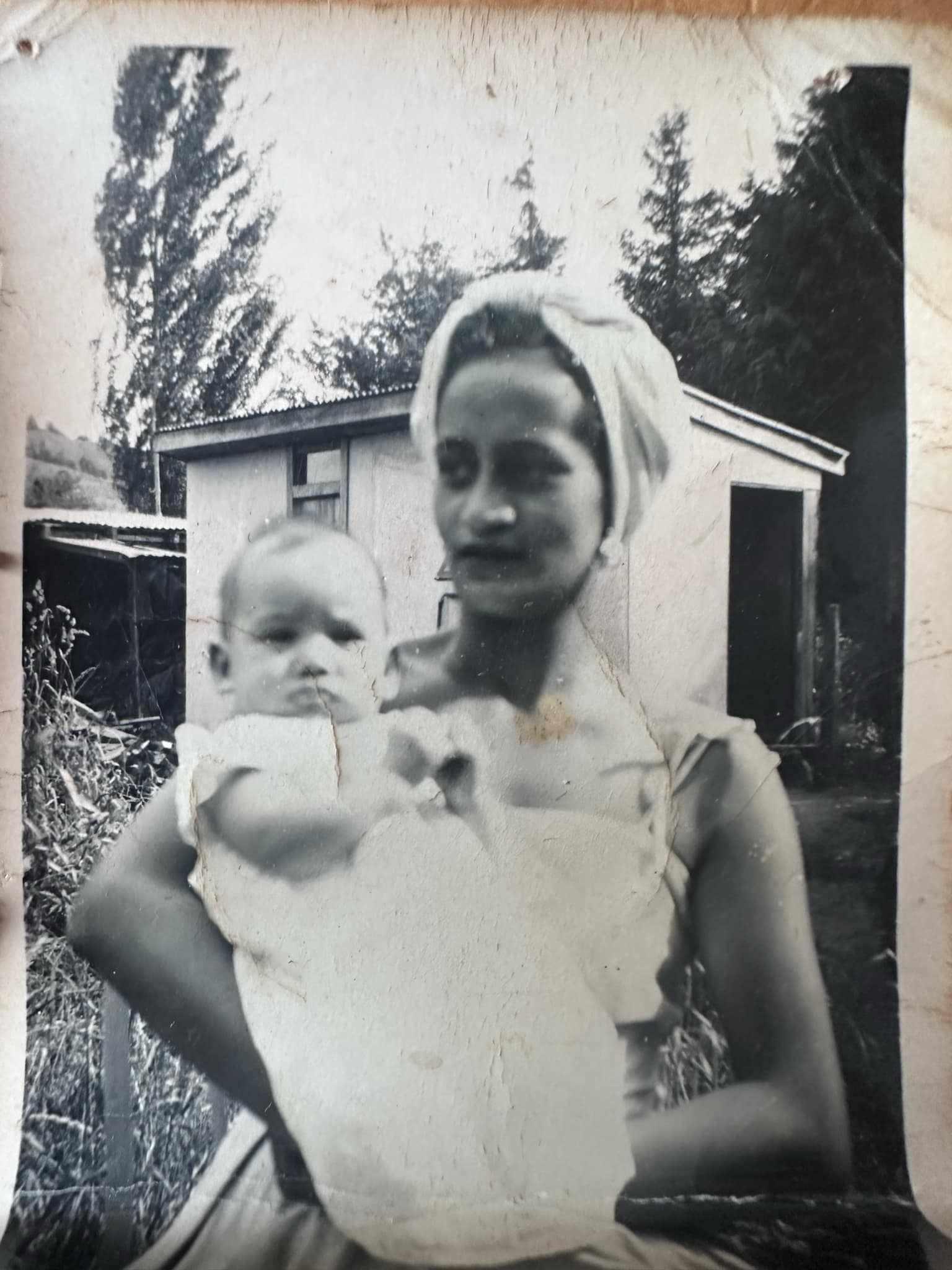 My beautiful Nan holding my Auntie in 1950s New Zealand | Scrolller