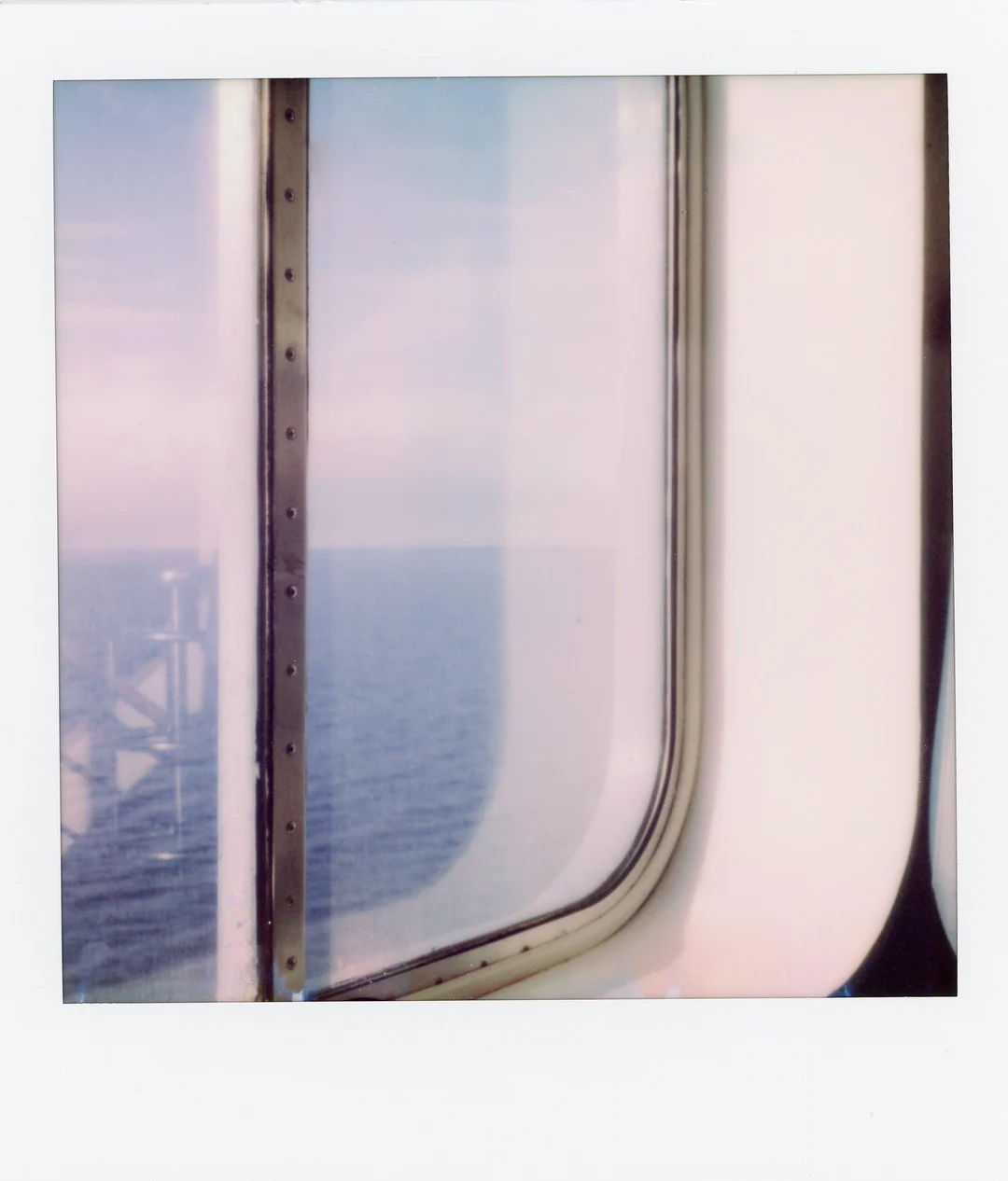 Ship window (converted SX-70) | Scrolller