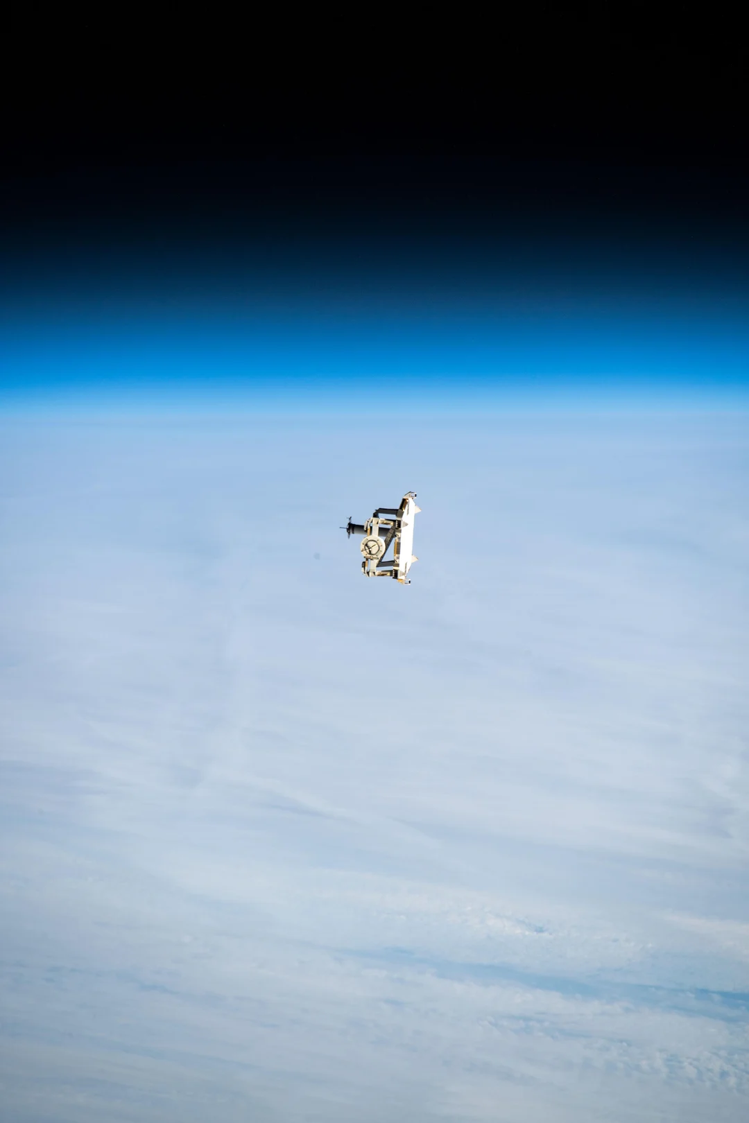 Flight Support Equipment is Descending Toward The Earth's Atmosphere | Scrolller
