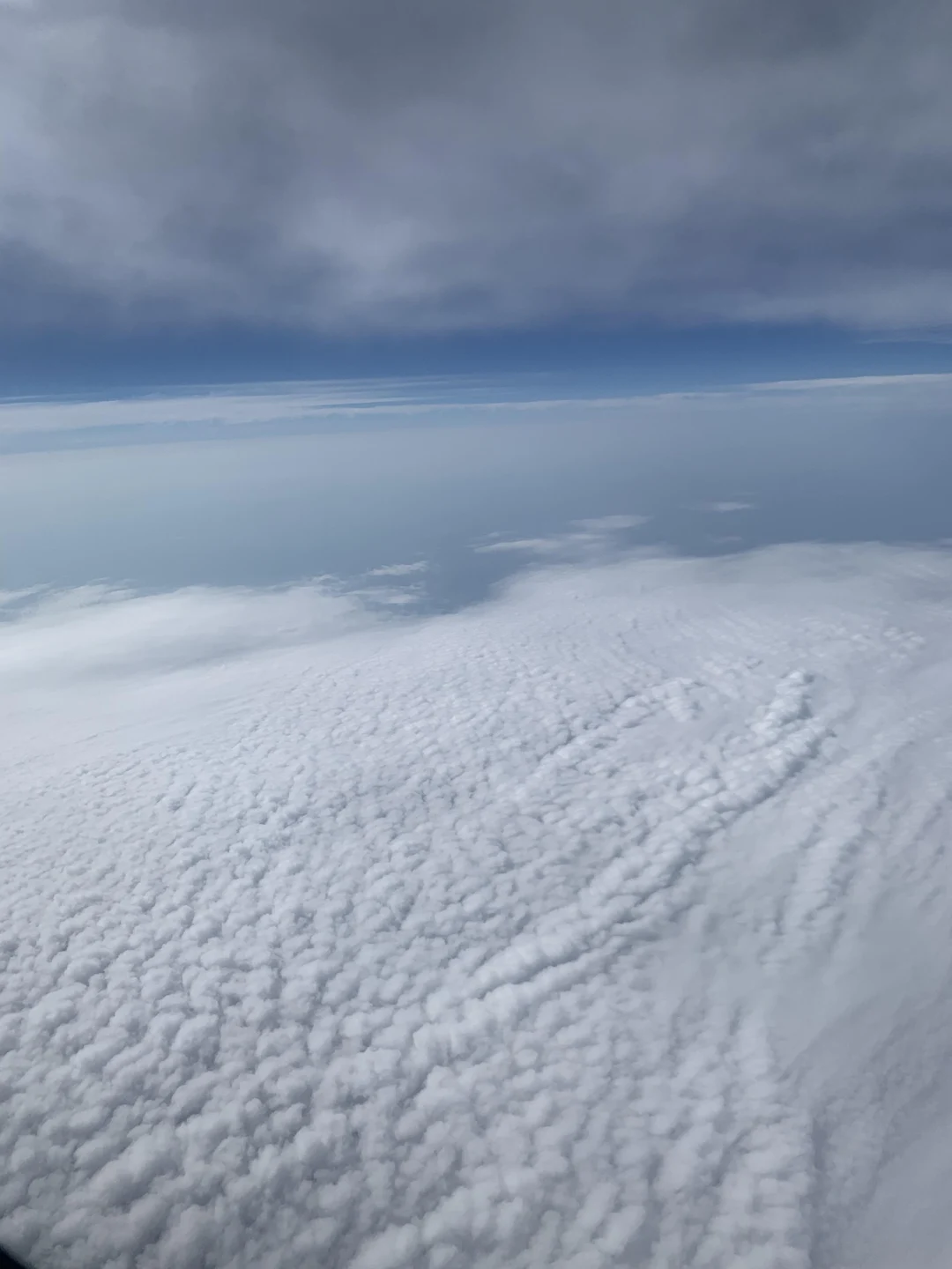 Sandwiched between two layers of clouds | Scrolller