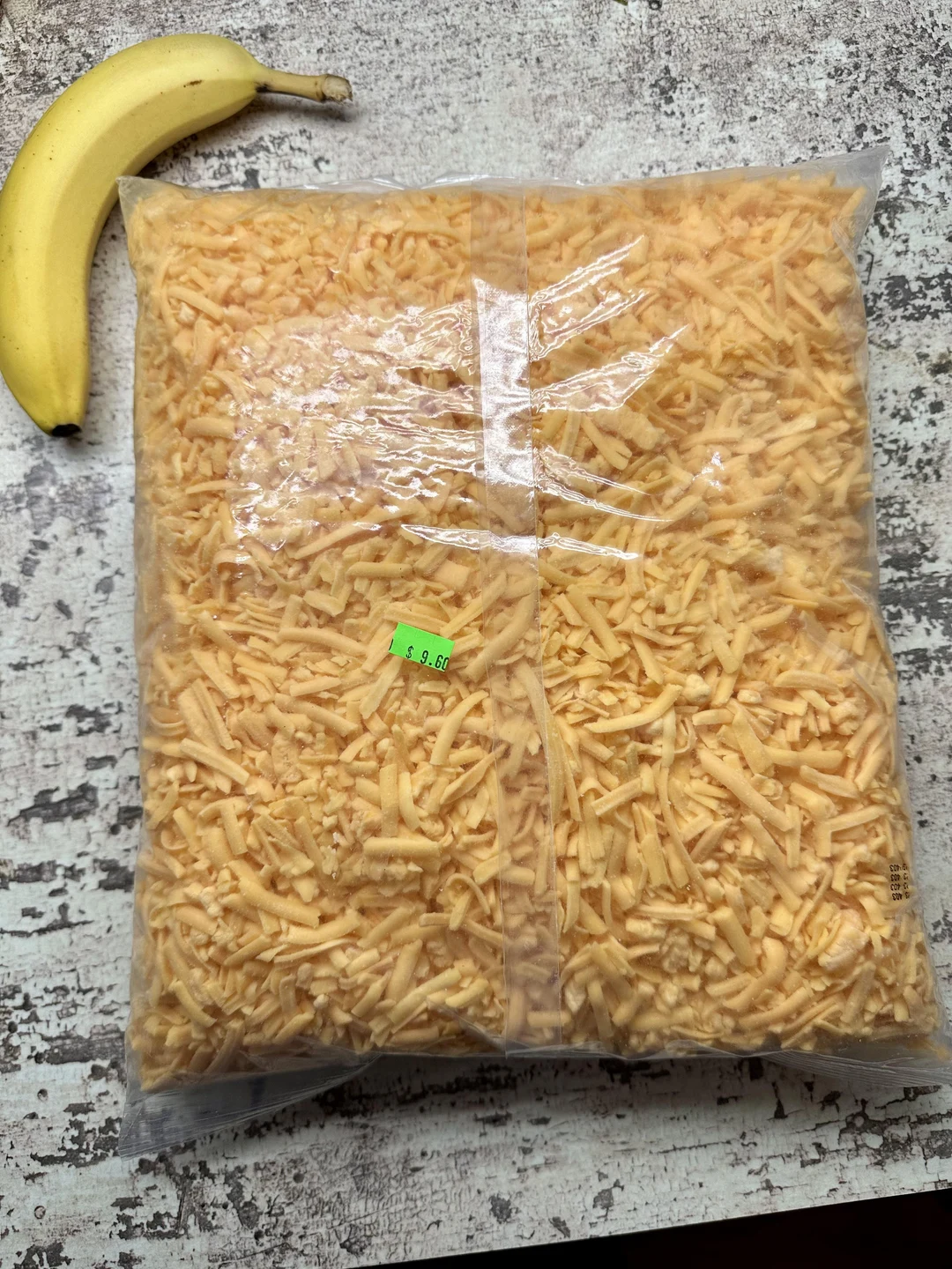 5 lbs of Shredded Sharp Cheddar for $1.92/lb. Man, I love living in Wisconsin. I wonder how many ...