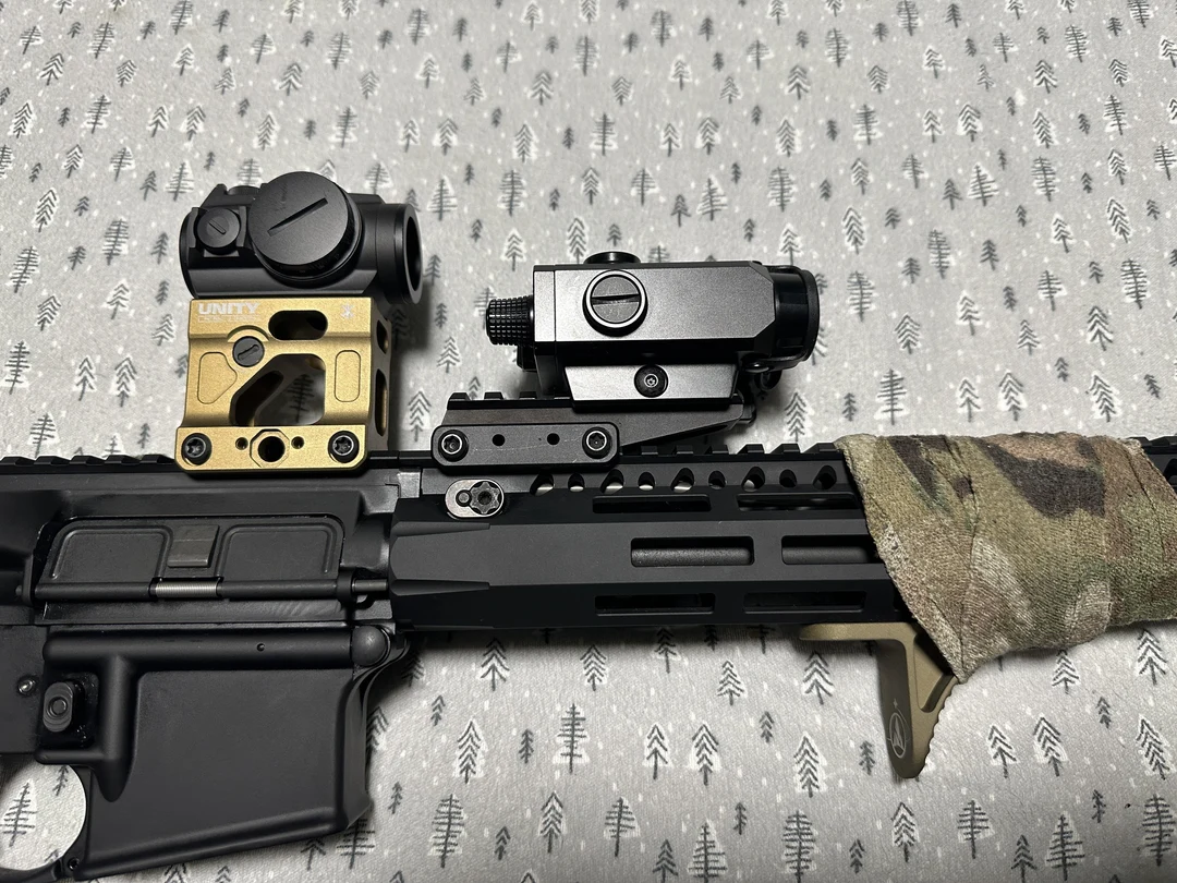 Has anyone ever seen this laser mounting method before, using a basic unity riser? | Scrolller