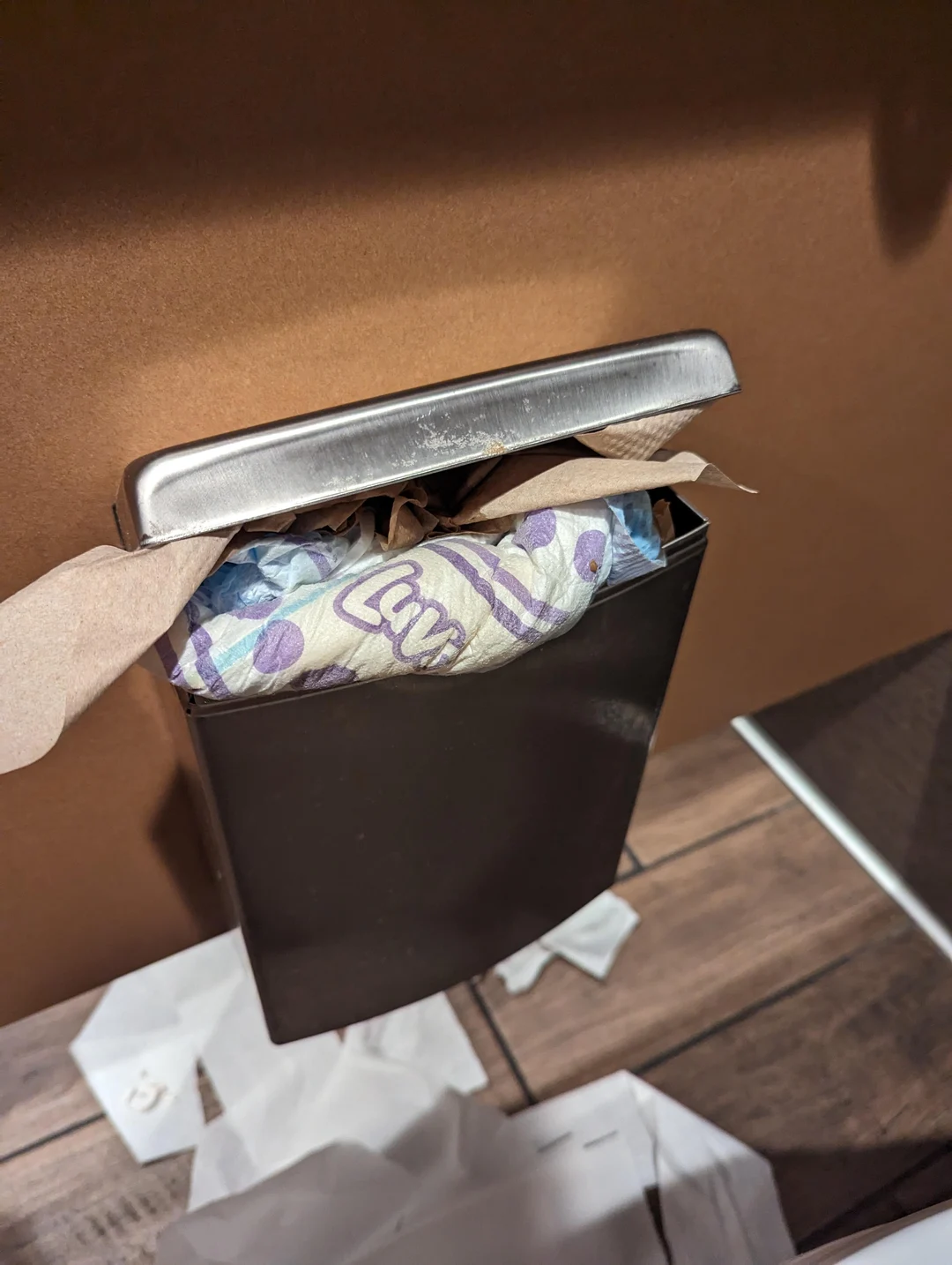 Diaper shoved in the feminine waste bin | Scrolller