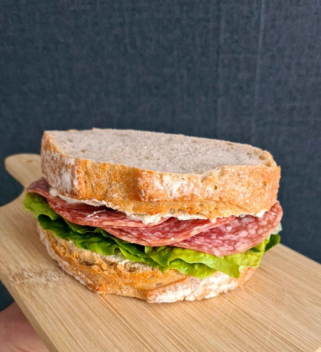 Salami, cream cheese and lettuce on sourdough. | Scrolller