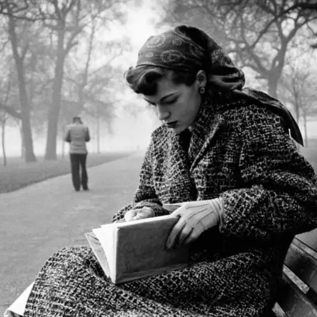Journalist Katharine Whitehorn reading a book in Hyde Park, London. Photo by Bert Hardy,1956 ...