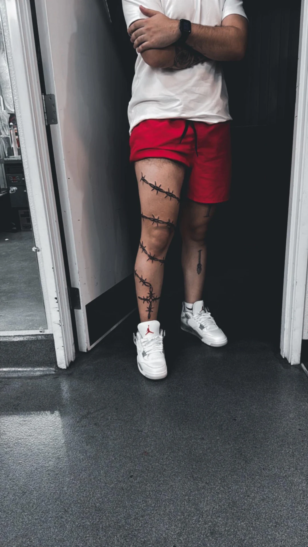 Barbed wire cross all around the leg by Buddy from In The Skin Pasadena, CA | Scrolller