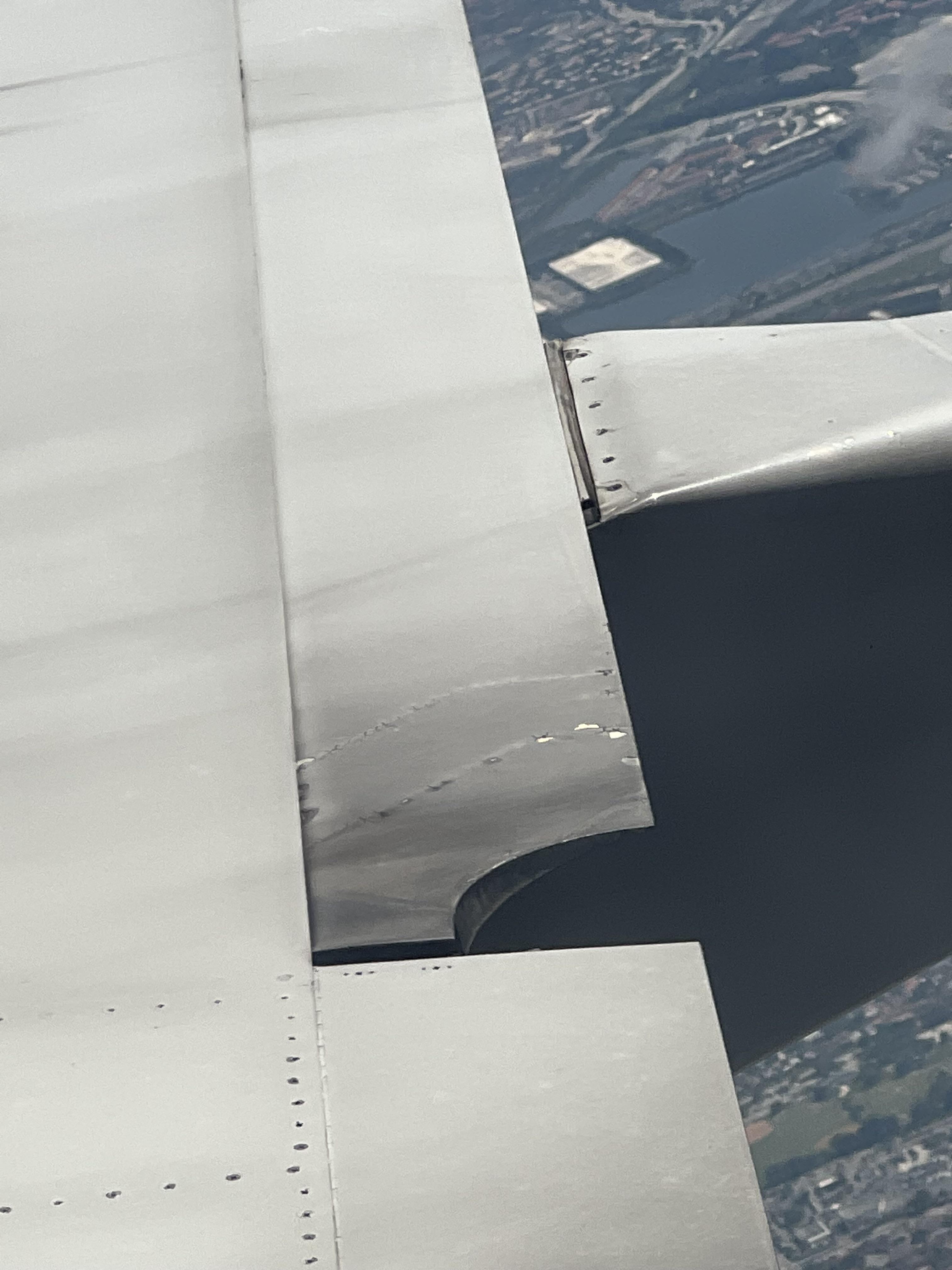 Is this piece supposed to be missing from an aircraft wing? | Scrolller