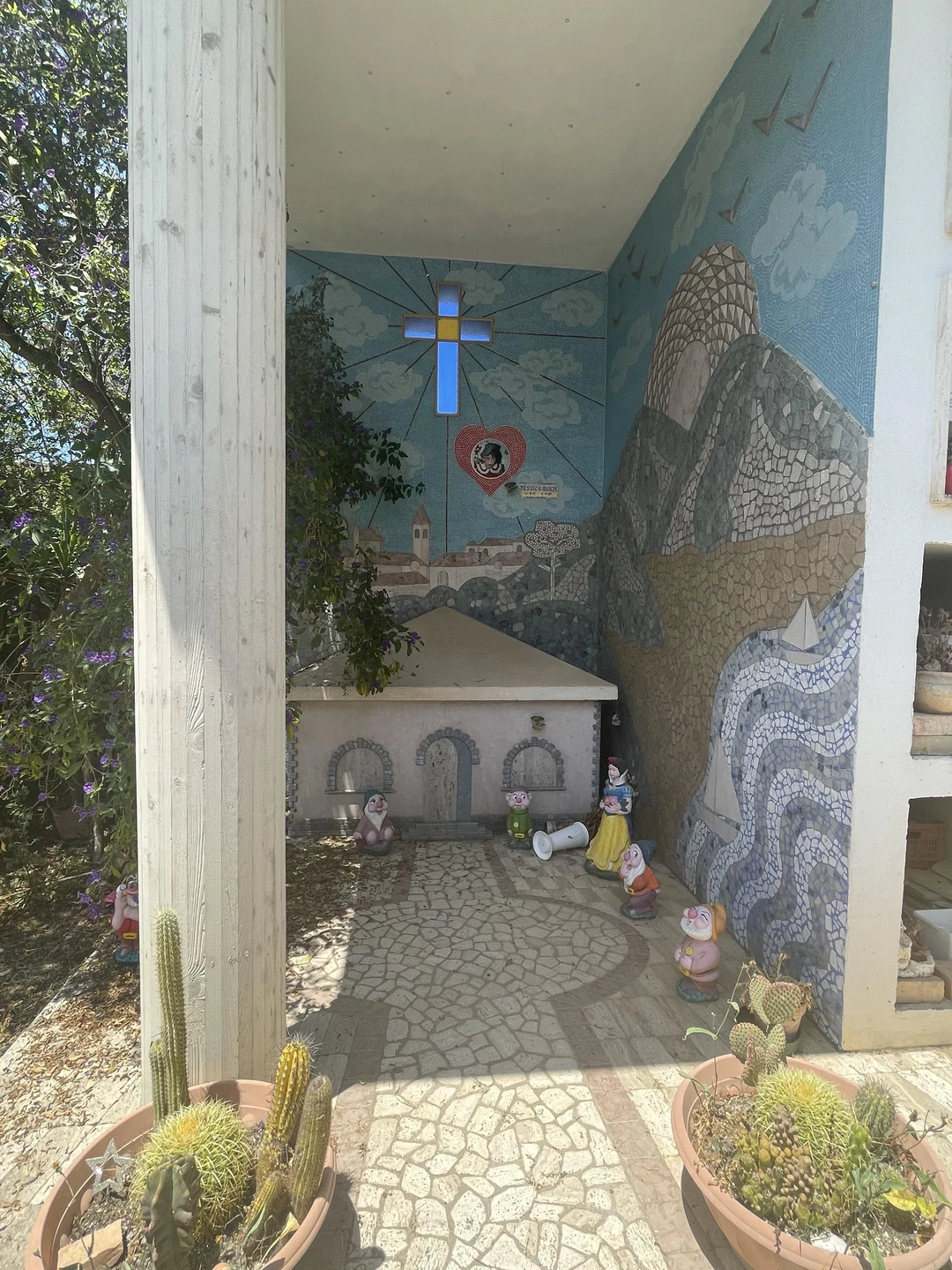 Capo Vaticano, Italy. Jessica Cruz, entombed in her castle with Snow White and the Seven Dwarfs ...