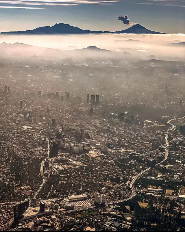 Mexico City under the sea of smog. Credits to @danielaguilarphoto ...