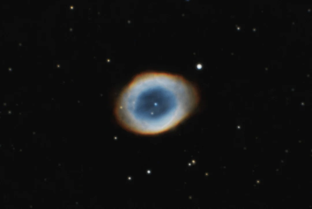 A super zoomed in photo of the "Ring Nebula" through my telescope | Scrolller