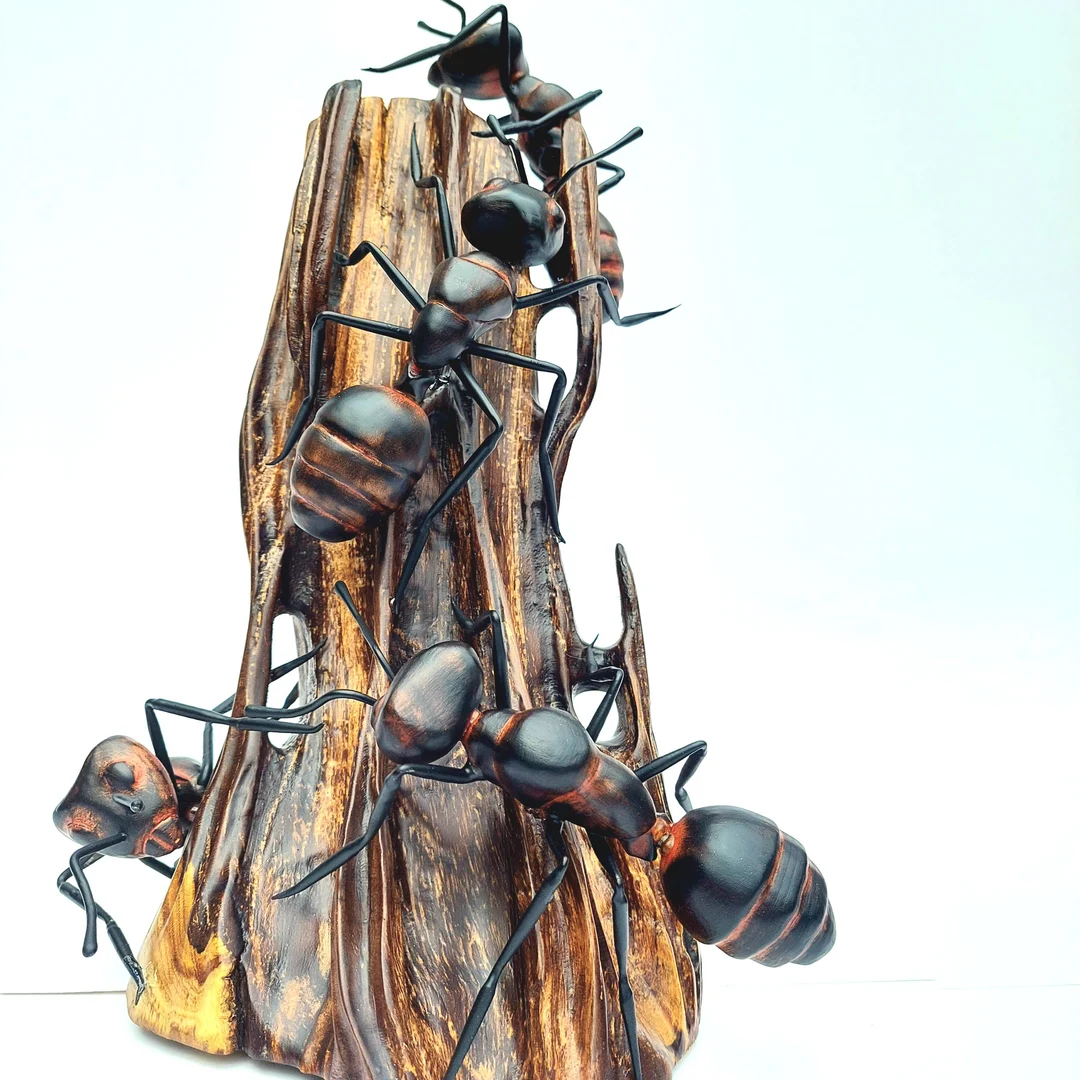 Carpenter ants, me, carved wood and metal, 2022 | Scrolller