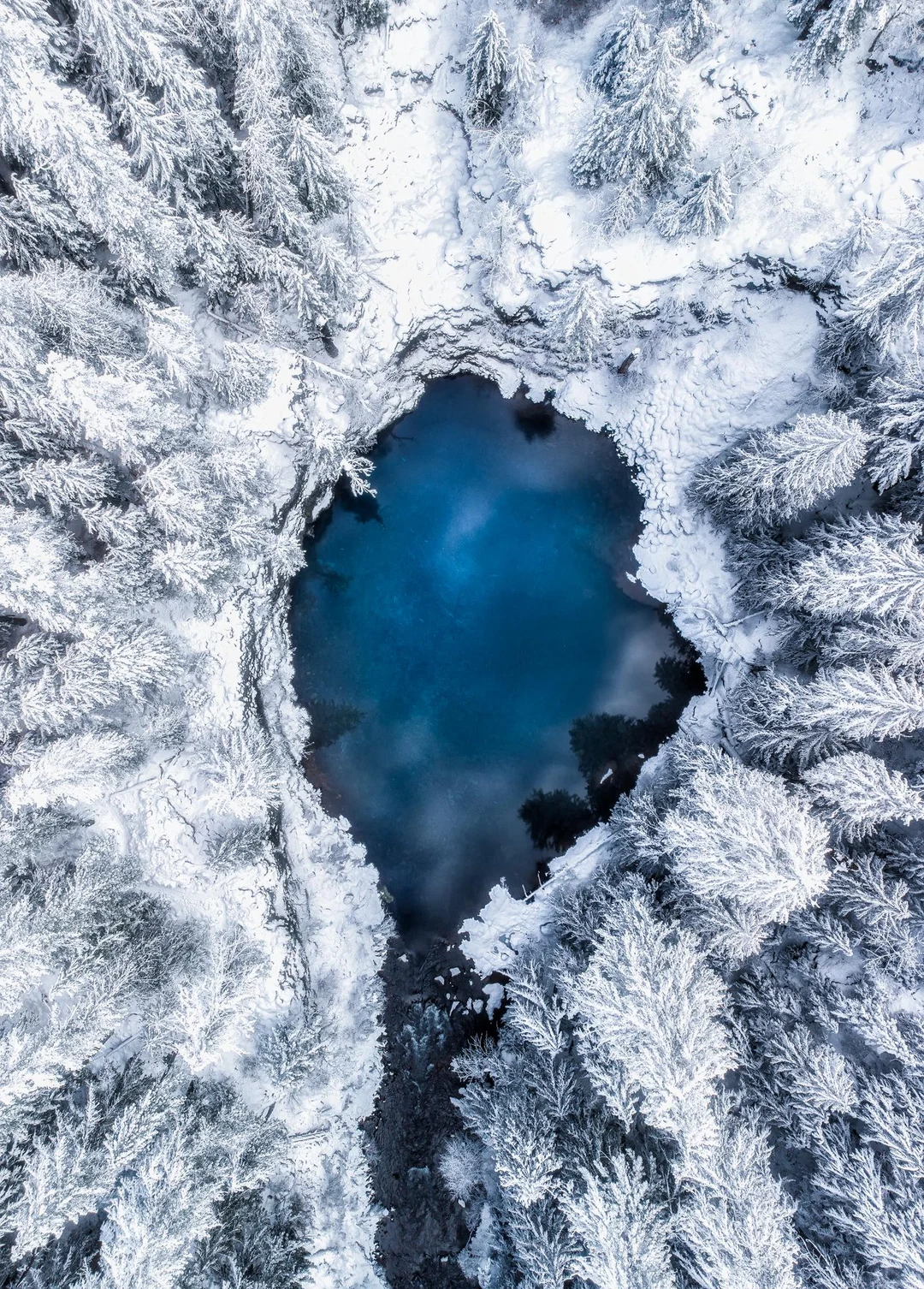 An aerial view of a river in Central Oregon after fresh snow. [1434x2000][OC] | Scrolller